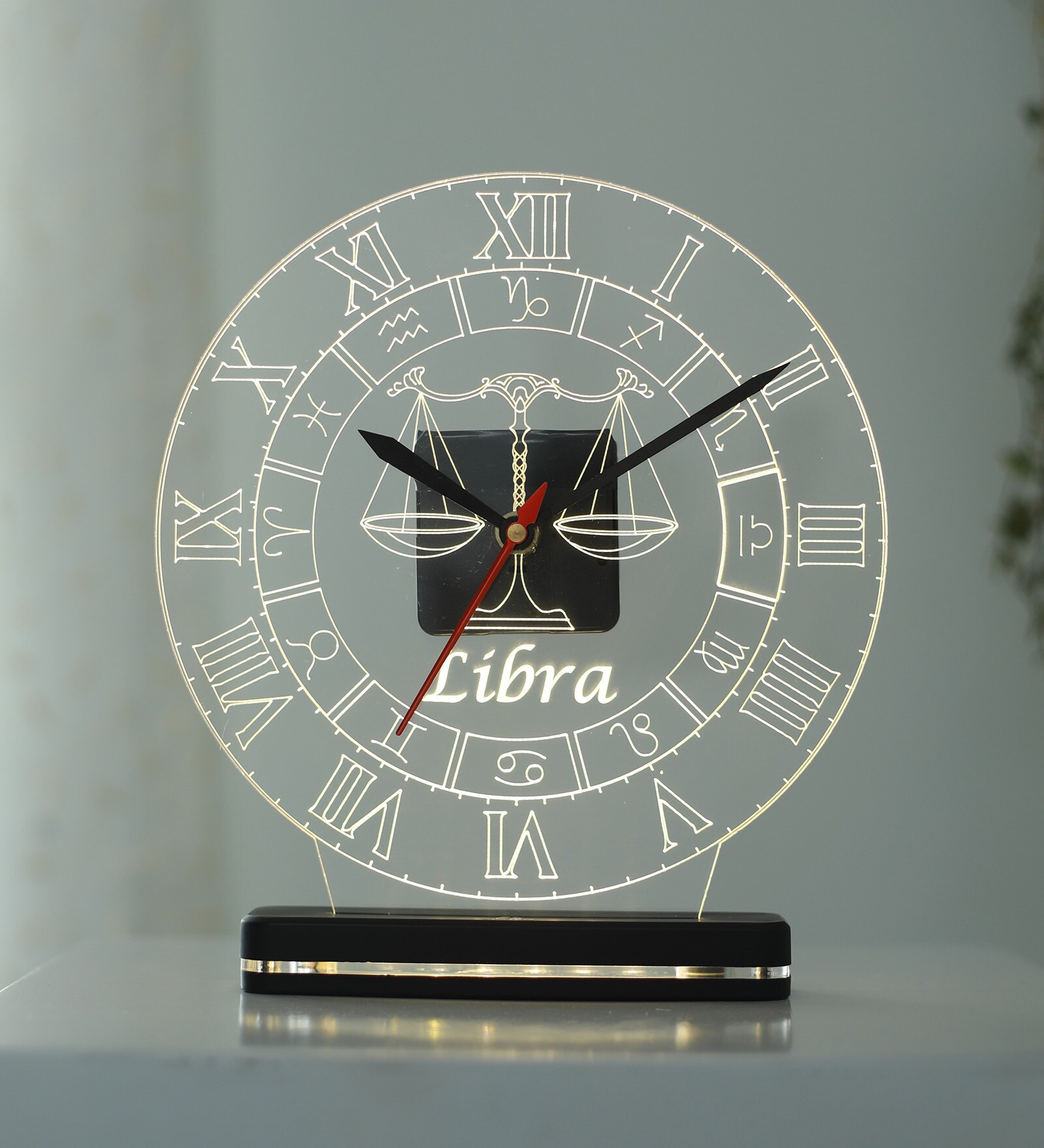 Buy Libra Transparent Plastic Table Clock With LED Lights at 27% OFF by LIT Lamps | Pepperfry
