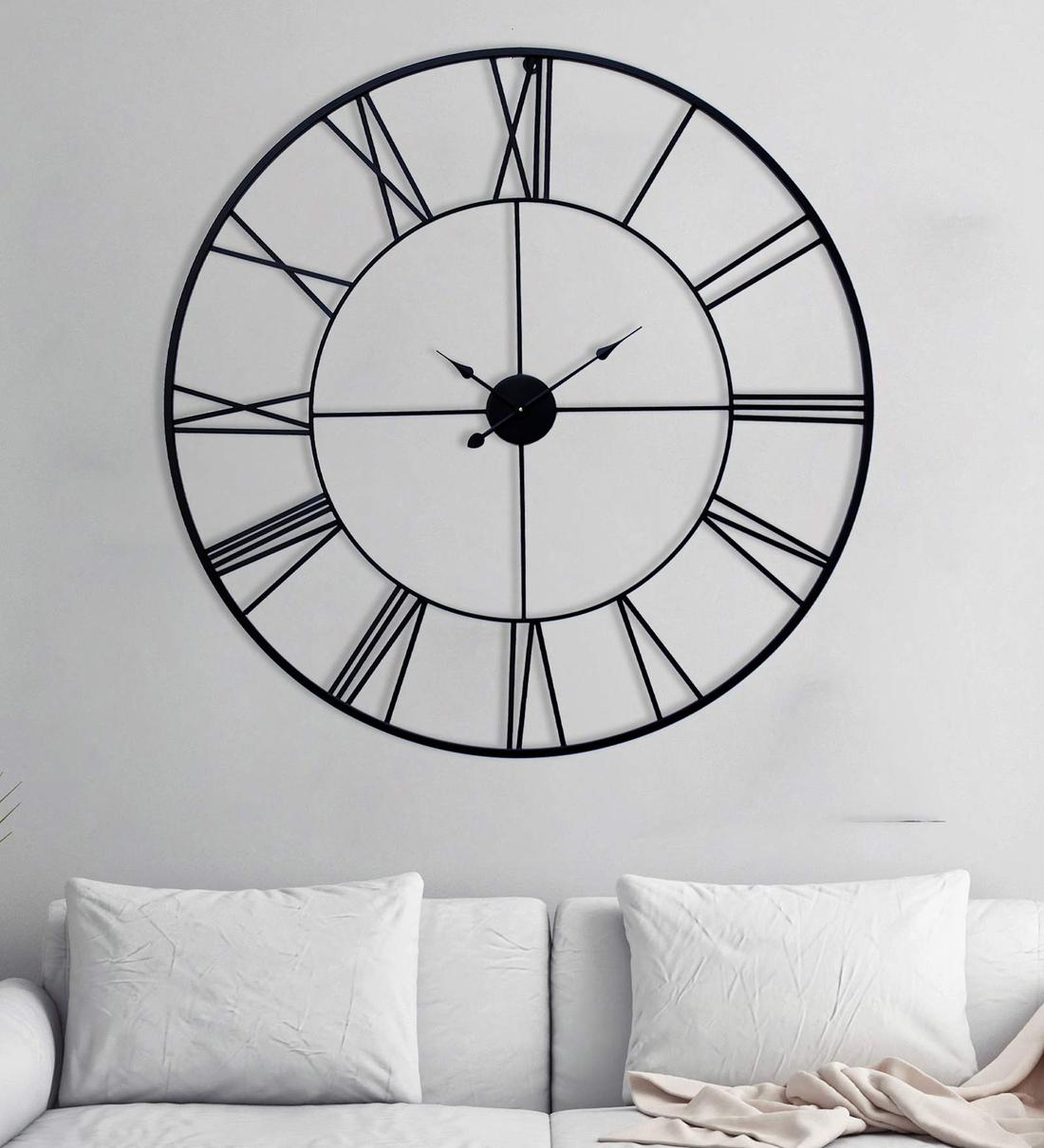 Buy Black Metal Clap Novelty Wall Clock at 5% OFF by Craftter | Pepperfry