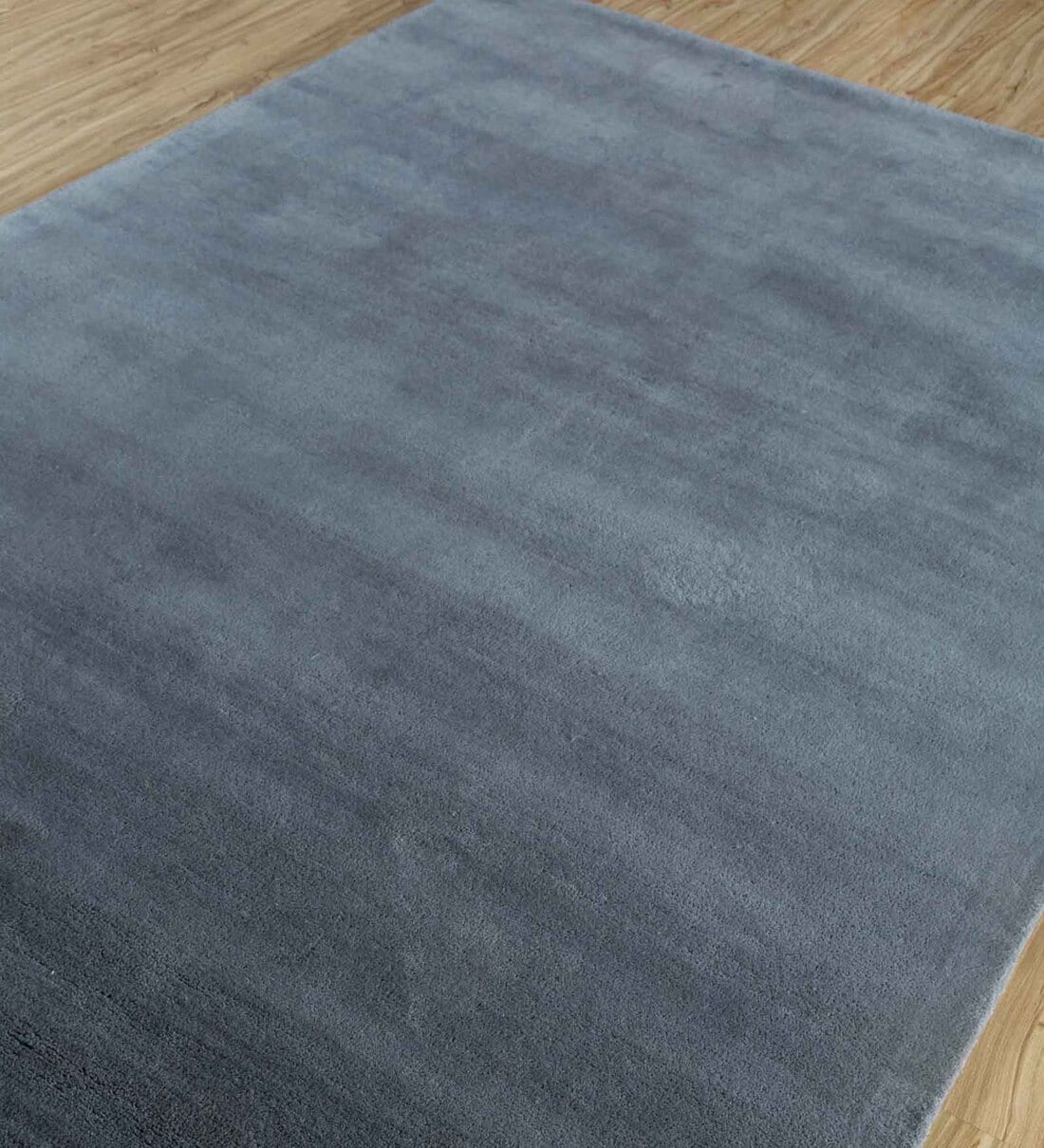 Buy Blue Solid Wool 5 ft x 7 ft Hand Tufted Carpet at 100% OFF by ...