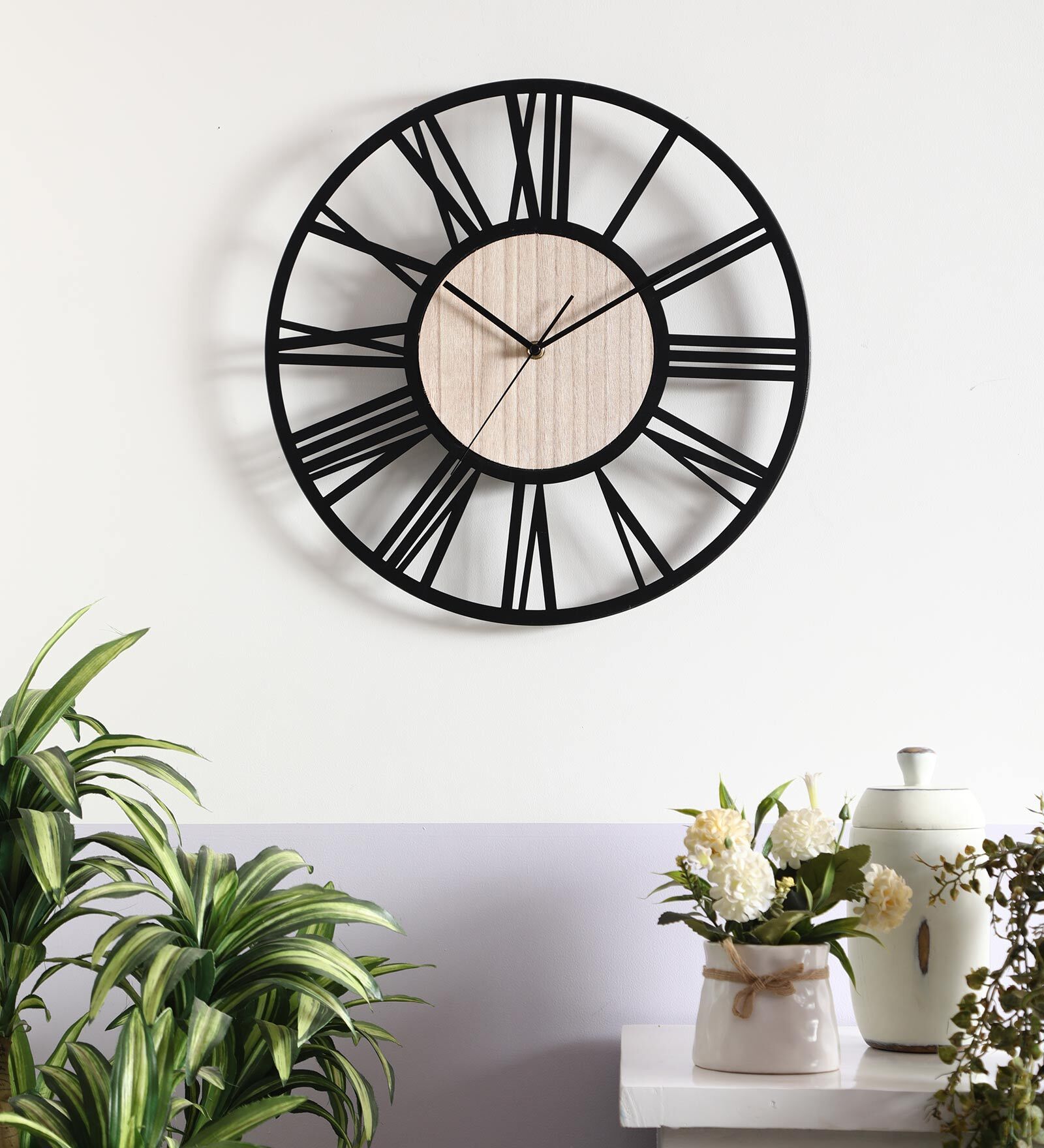 Buy Black Metal Analog Novelty Wall Clock at 33% OFF by am2pm | Pepperfry