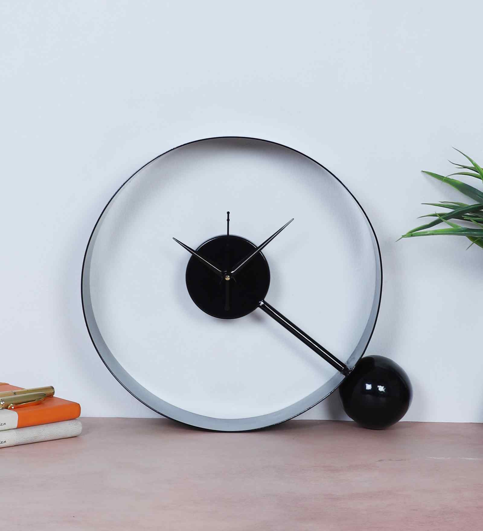 Buy Black Round Ball Table Clock at 30% OFF by Amaya Decors | Pepperfry