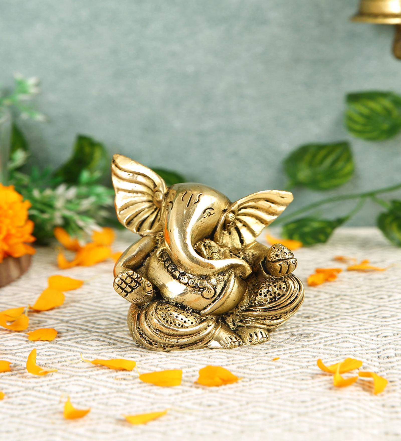 Buy Blessing Ganesh Gold Brass Idol at 38% OFF by Imli street | Pepperfry