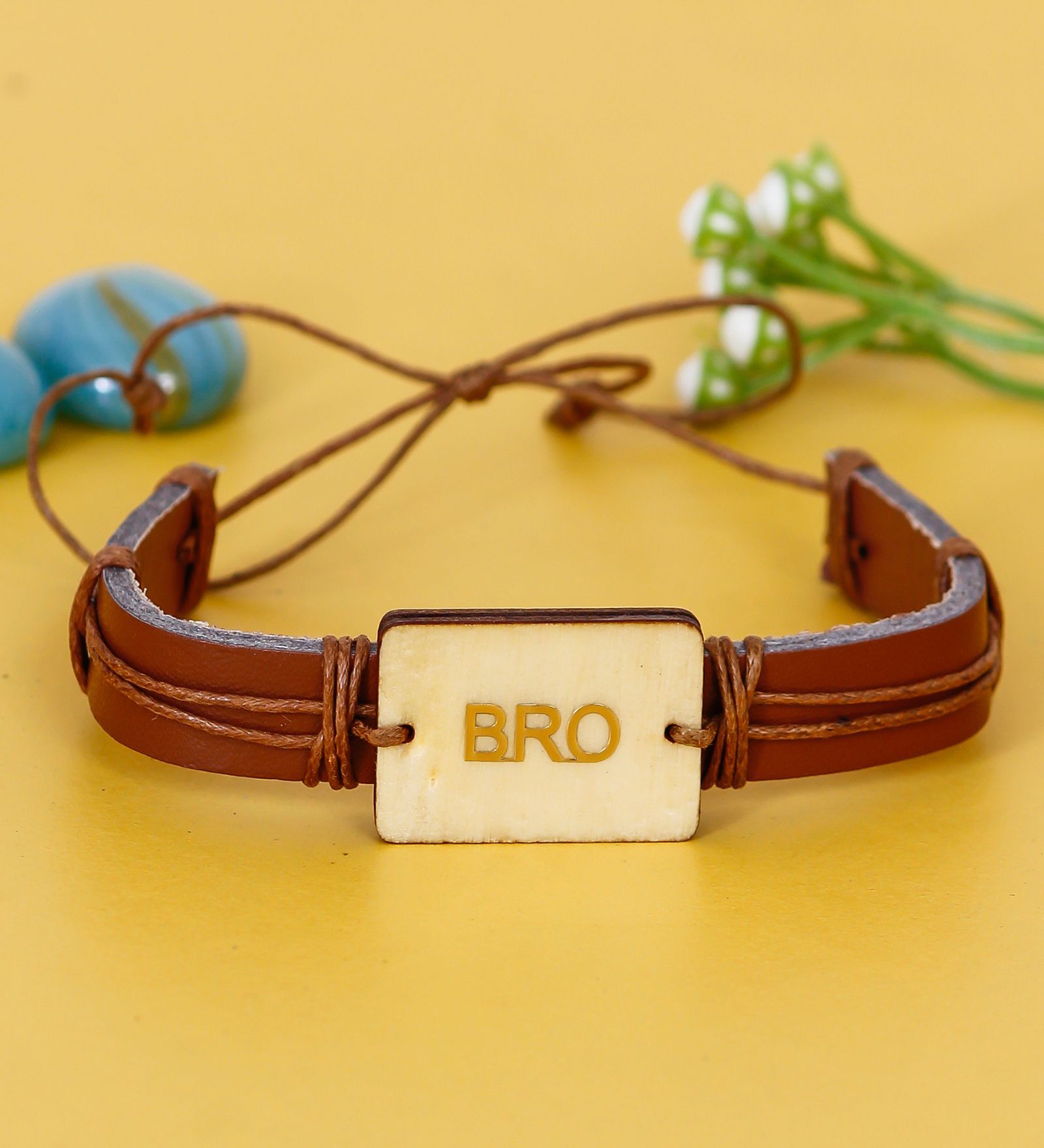 Buy Brown Bro Word Bracelet Rakhi with Roli Chawal Pack at 25% OFF by ...