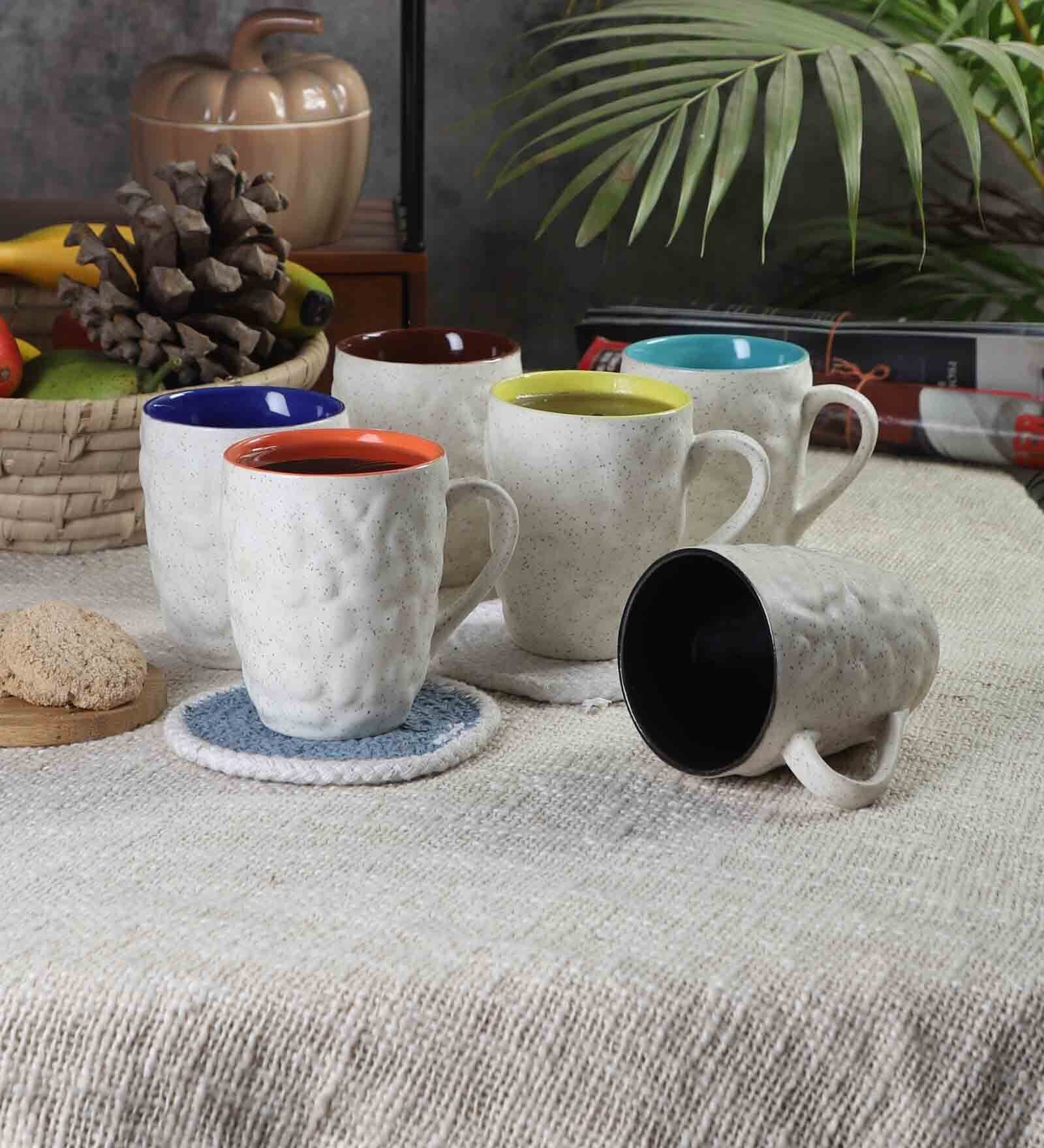 Buy 250 ML White Ceramic (Set of 7) Mugs at 50% OFF by Cdi | Pepperfry