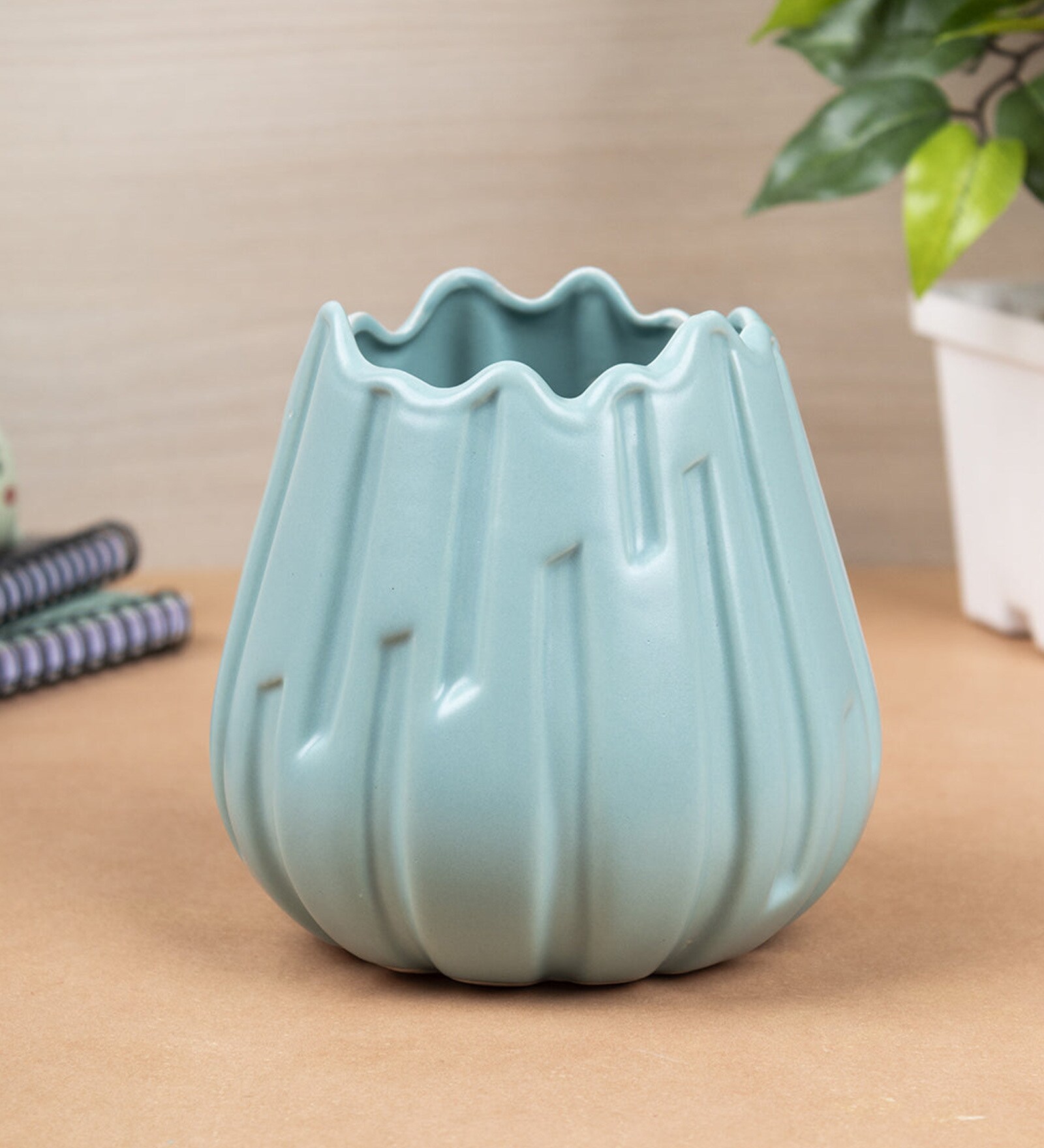 Buy Ceramic Turquoise Vase By Market 99 at 34% OFF by Market 99 | Pepperfry