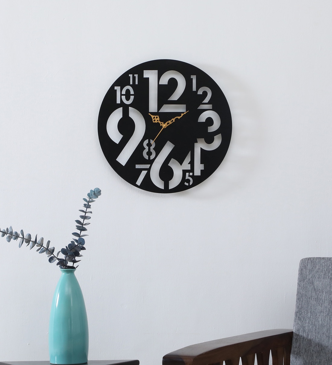 Buy Carl Iron Designer Wall Clock at 12% OFF by Mint Furnish | Pepperfry