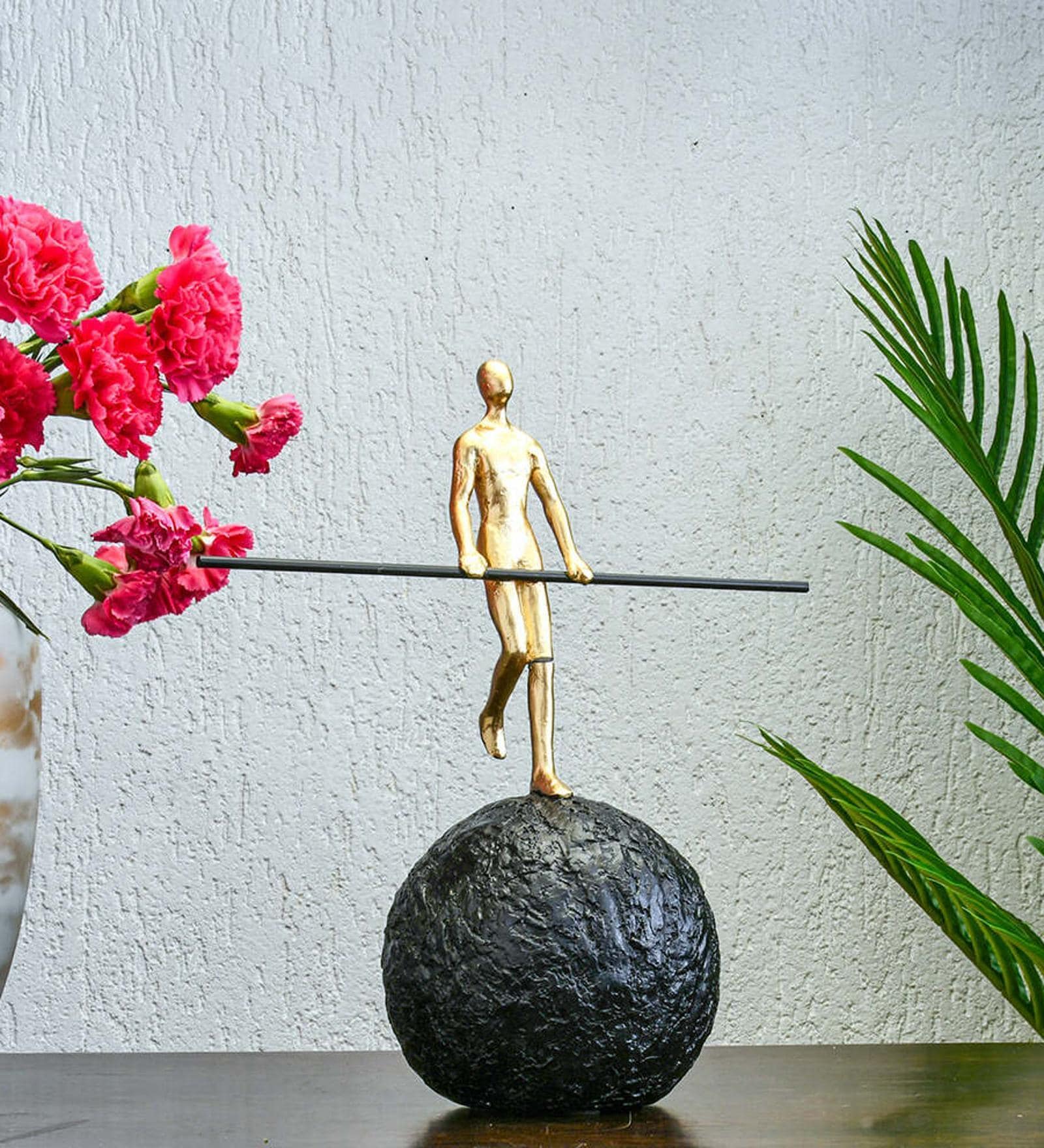 Buy Decorative Balancing Man Black & Gold Polyresin Showpiece at 100% ...