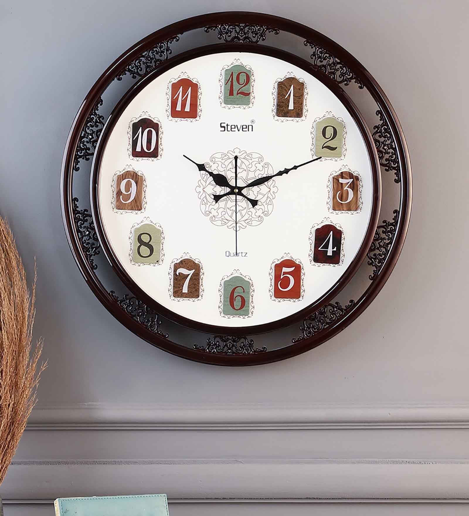 Buy Copper Plastic Dual Rings Modern Wall Clock at 10% OFF by Exim ...