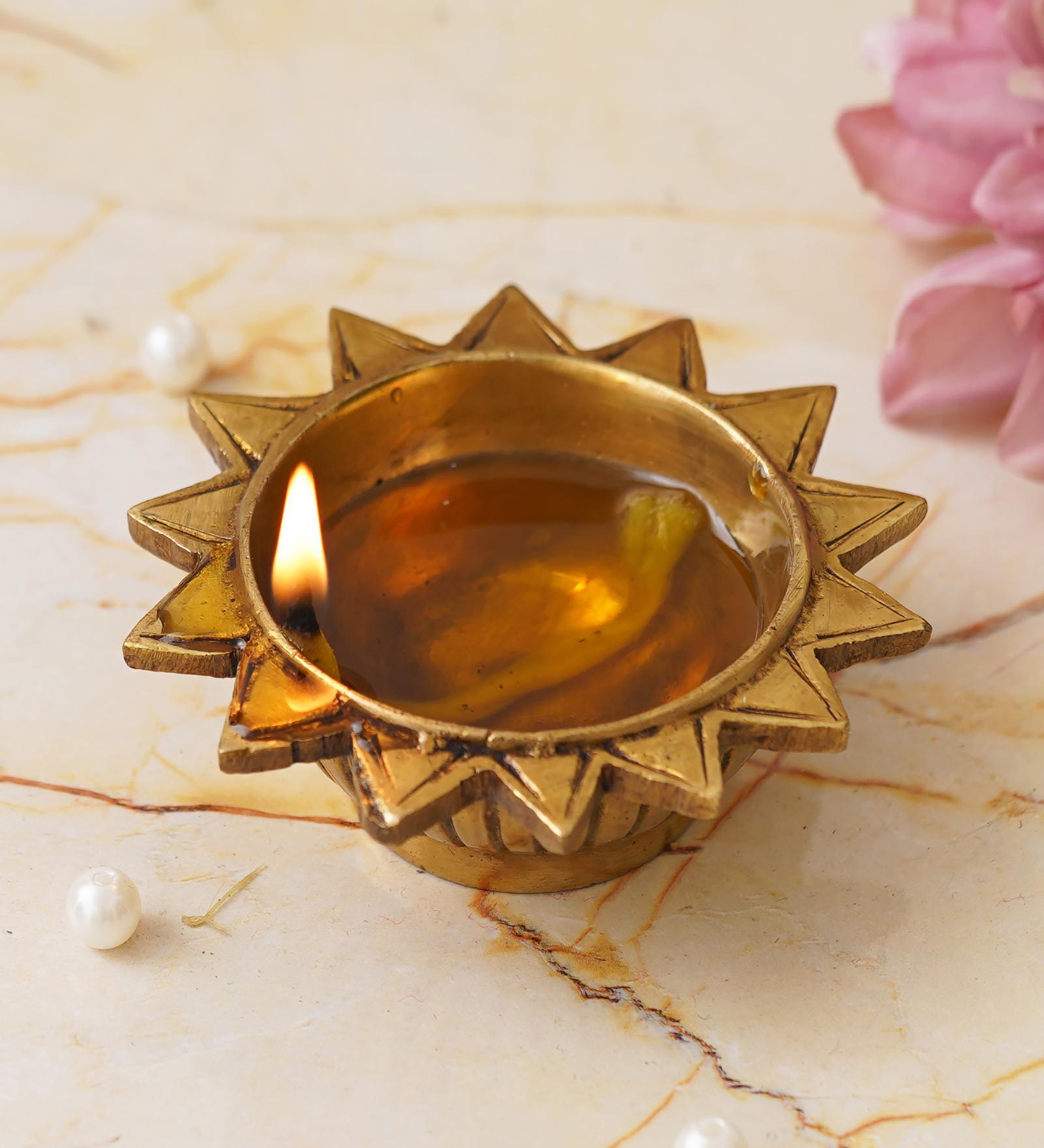 Buy Golden Sun Shaped Decorative Brass Diya at 23% OFF by eCraftIndia ...