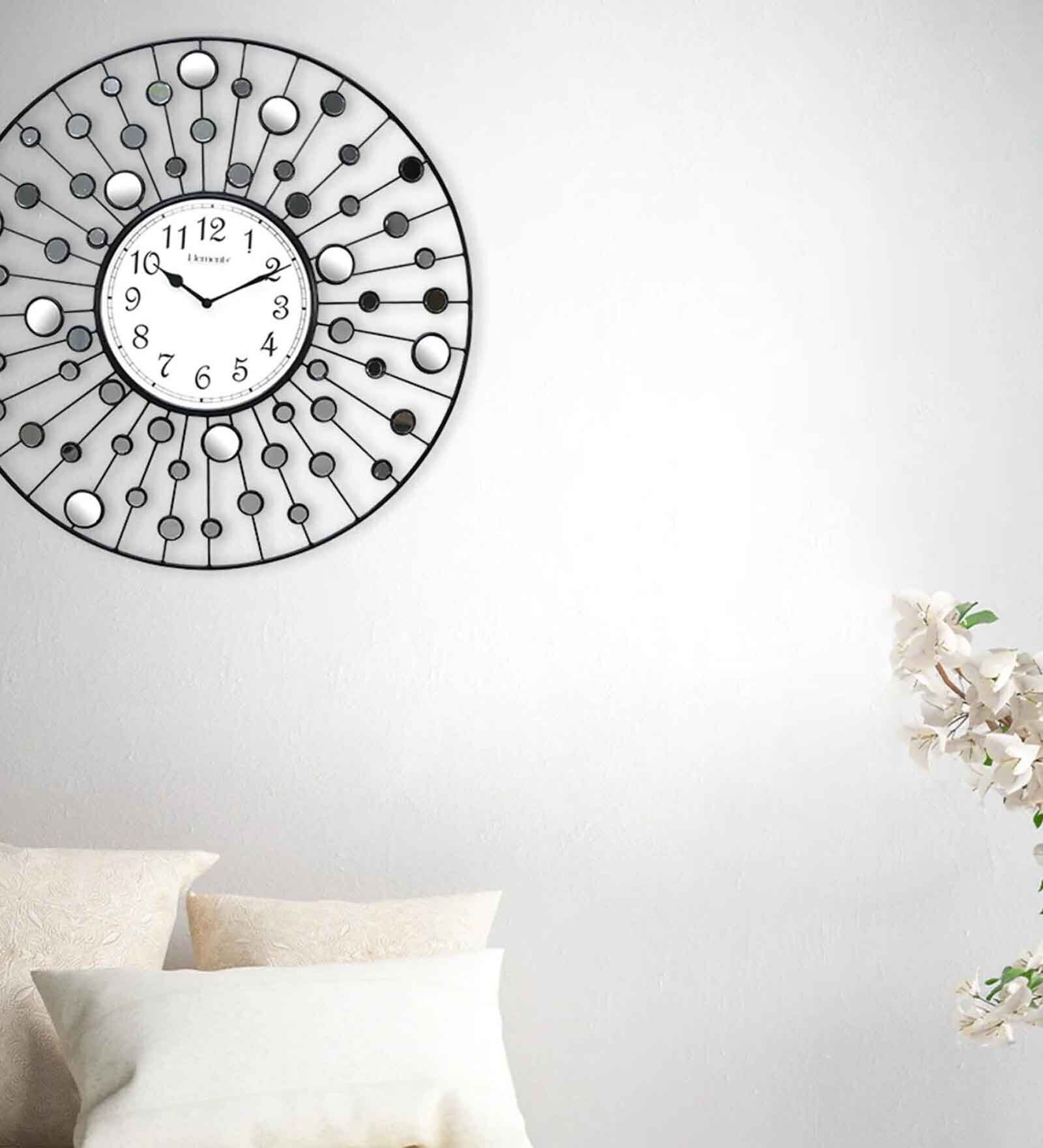 Buy Eva Black Metal Novelty Wall Clock at 27% OFF by @home | Pepperfry