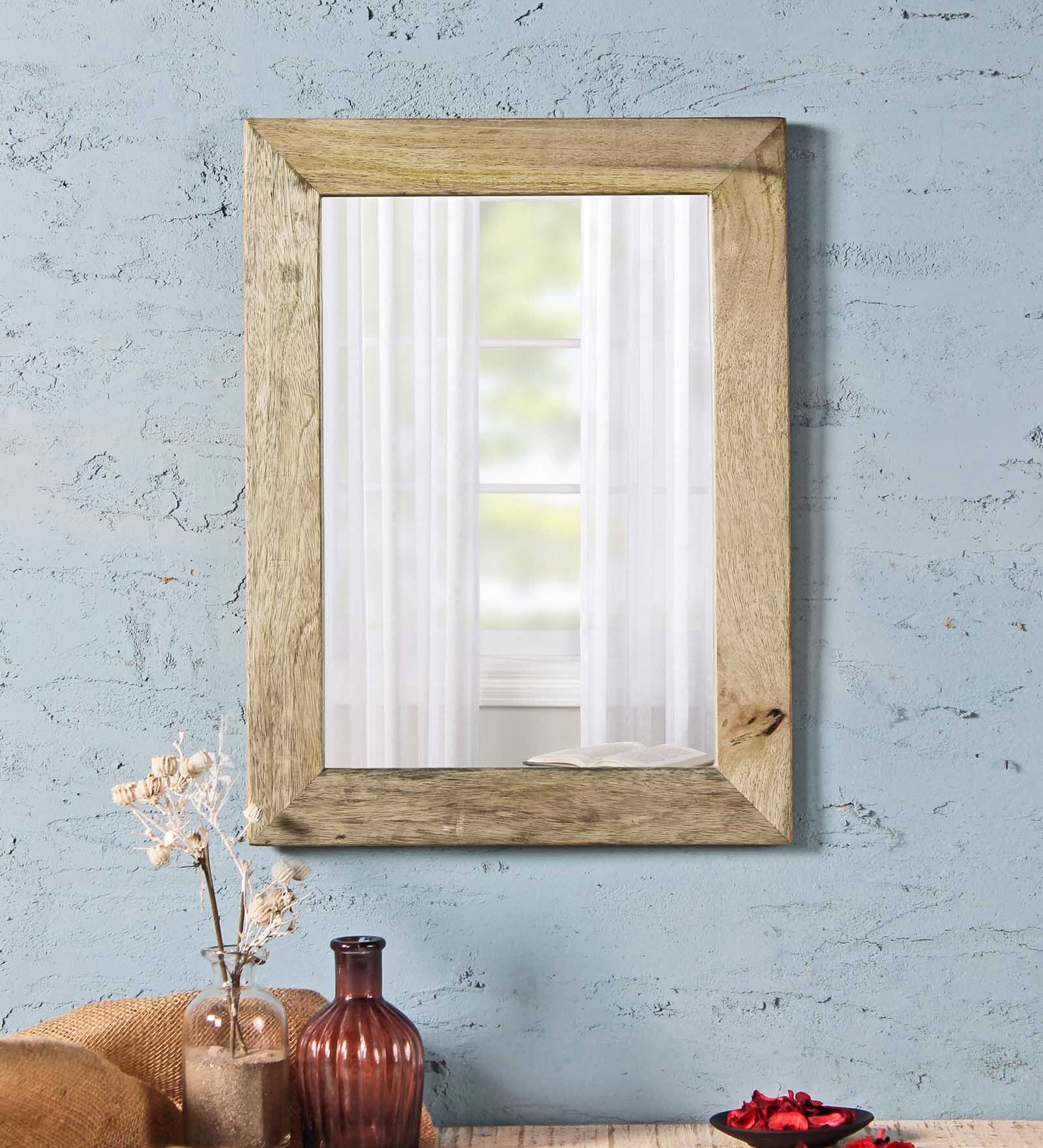 Buy Brown Mango Wood Wall Mirror at 19% OFF by Fabuliv | Pepperfry
