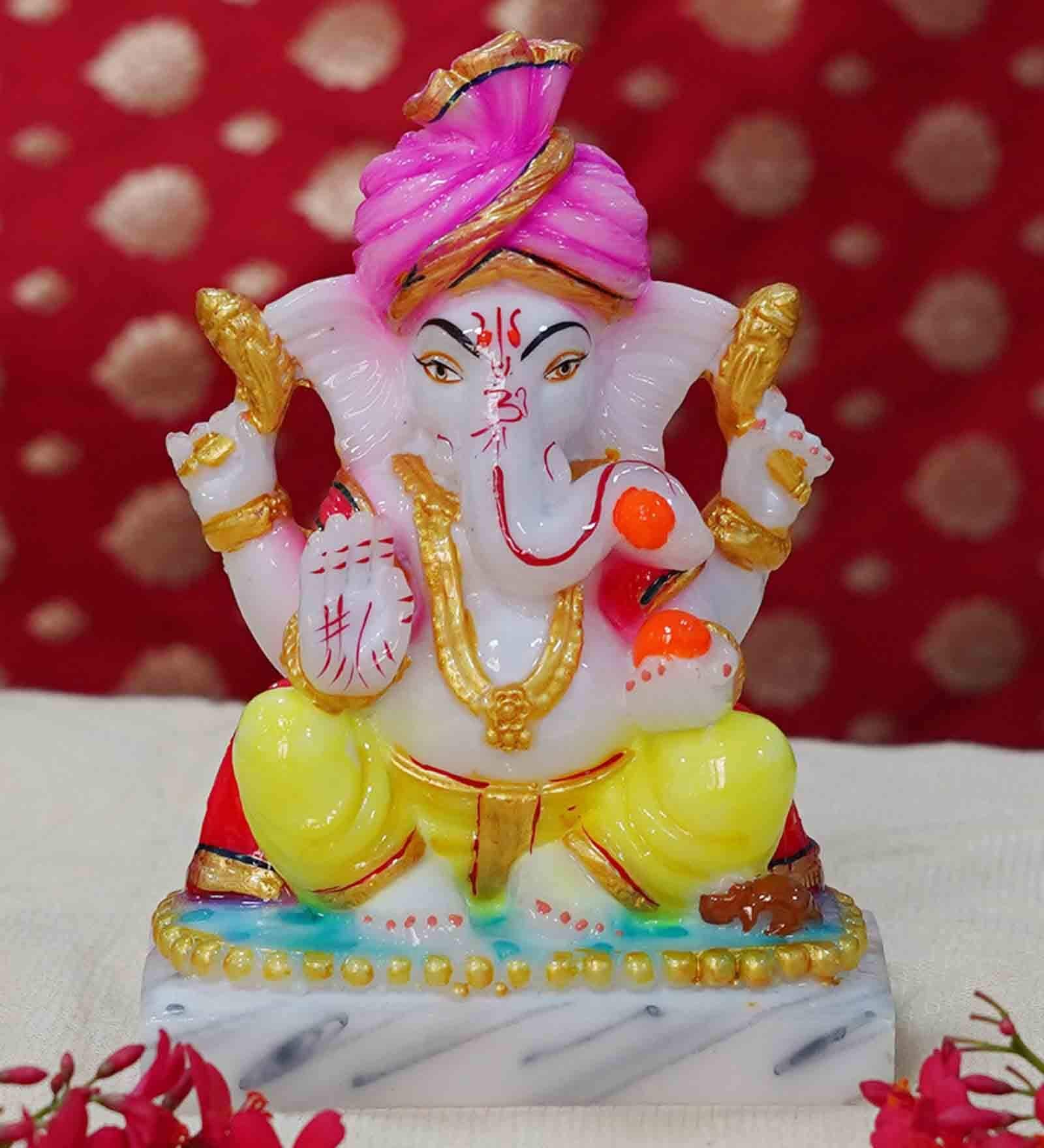 Buy Ganesh Handpainted Idol at 25% OFF by Chaque Decor | Pepperfry