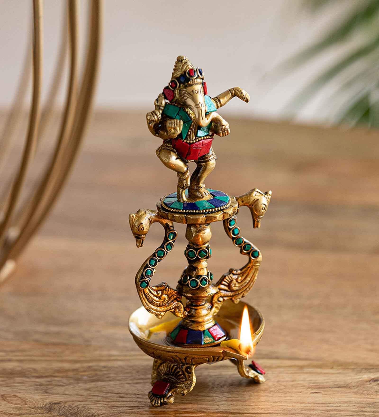 Buy Ganesha Gold Brass Table Diya at 21% OFF by ExclusiveLane | Pepperfry