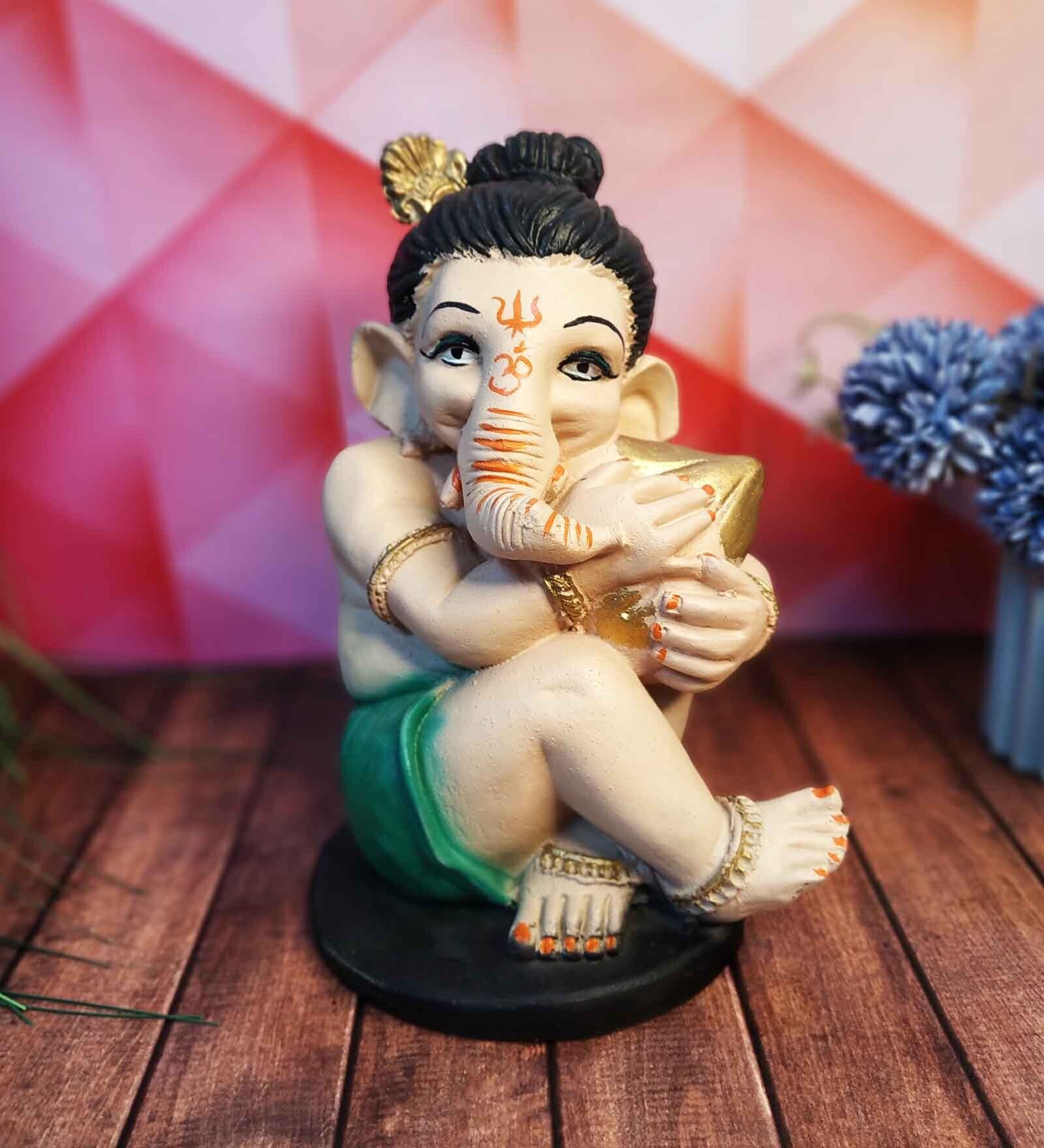 Buy Ganesha Multicolour Polyresin Statue at 32% OFF by Wens | Pepperfry