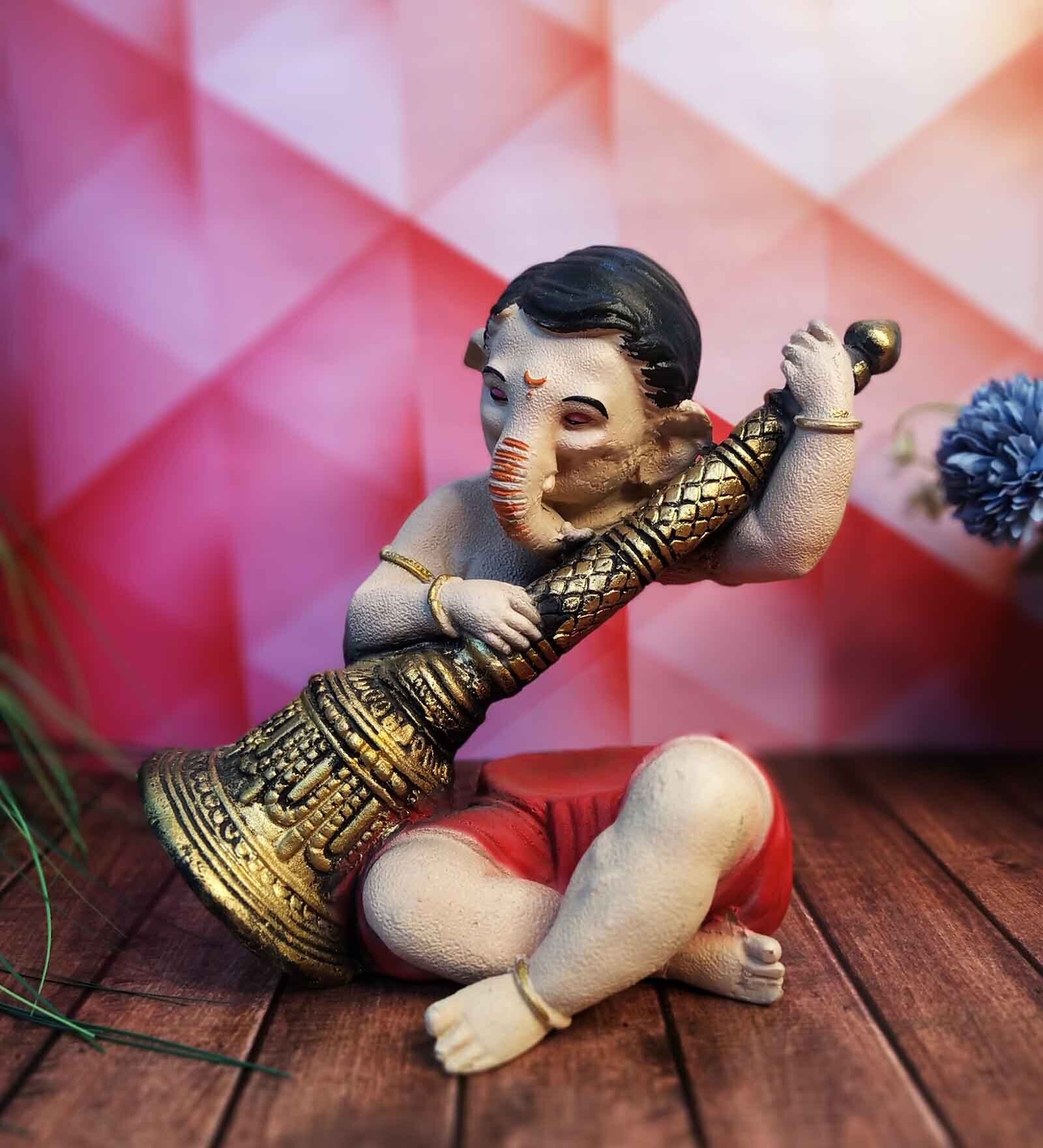 Buy Ganesha Multicolour Polyresin Statue at 36% OFF by Wens | Pepperfry
