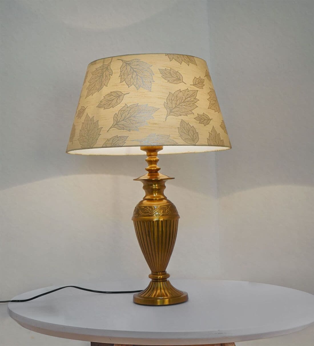 Buy Gold Leaf Taper Trophy Table Lamp at 5% OFF by Fos Lighting | Pepperfry