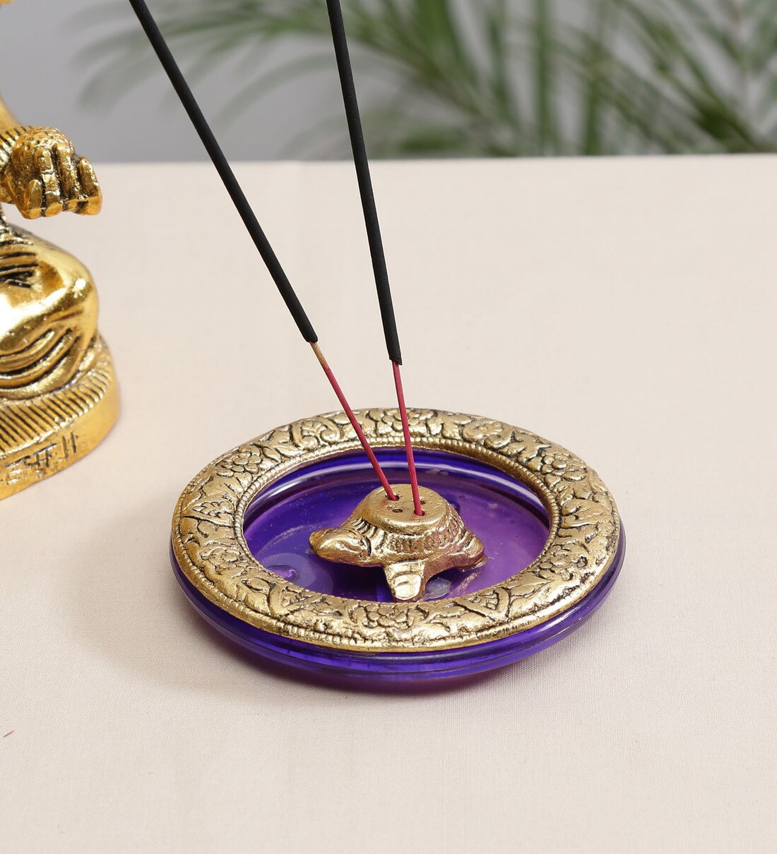Buy Gold Metal Tortoise Incense Holder Placed In Purple Glass Vessel at ...