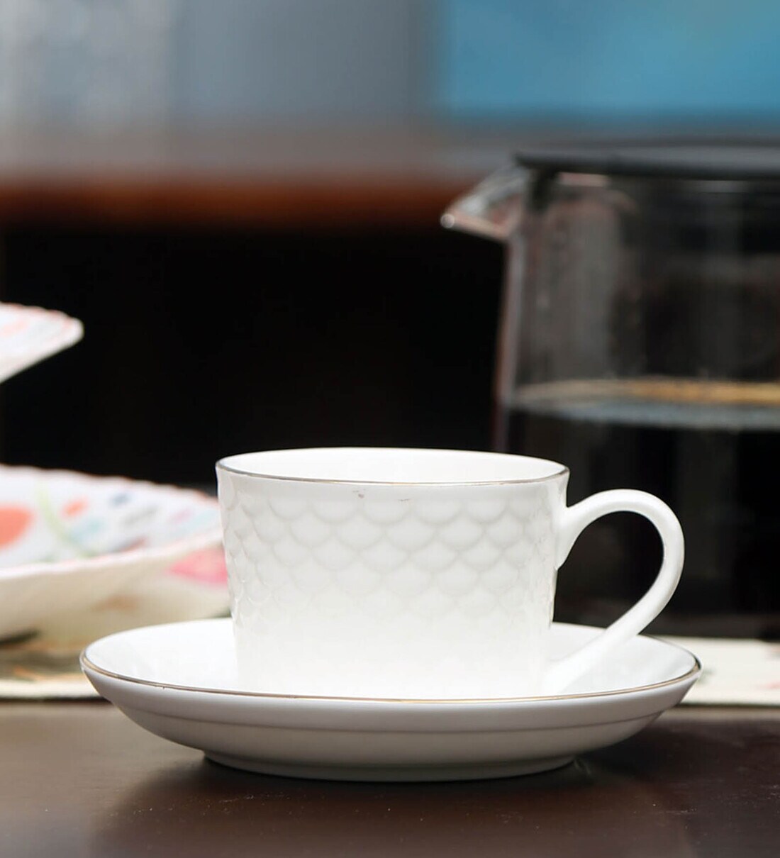 Buy Riple 230ml White Ceramic (Set of 12) Tea Cup & Saucer Set at 30% OFF by @home | Pepperfry
