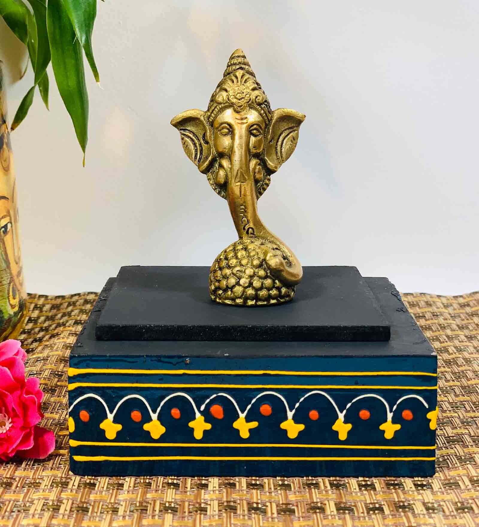 Buy Gold Brass Brass Engraved Ganesha Head With Laddu Base Idol by ...