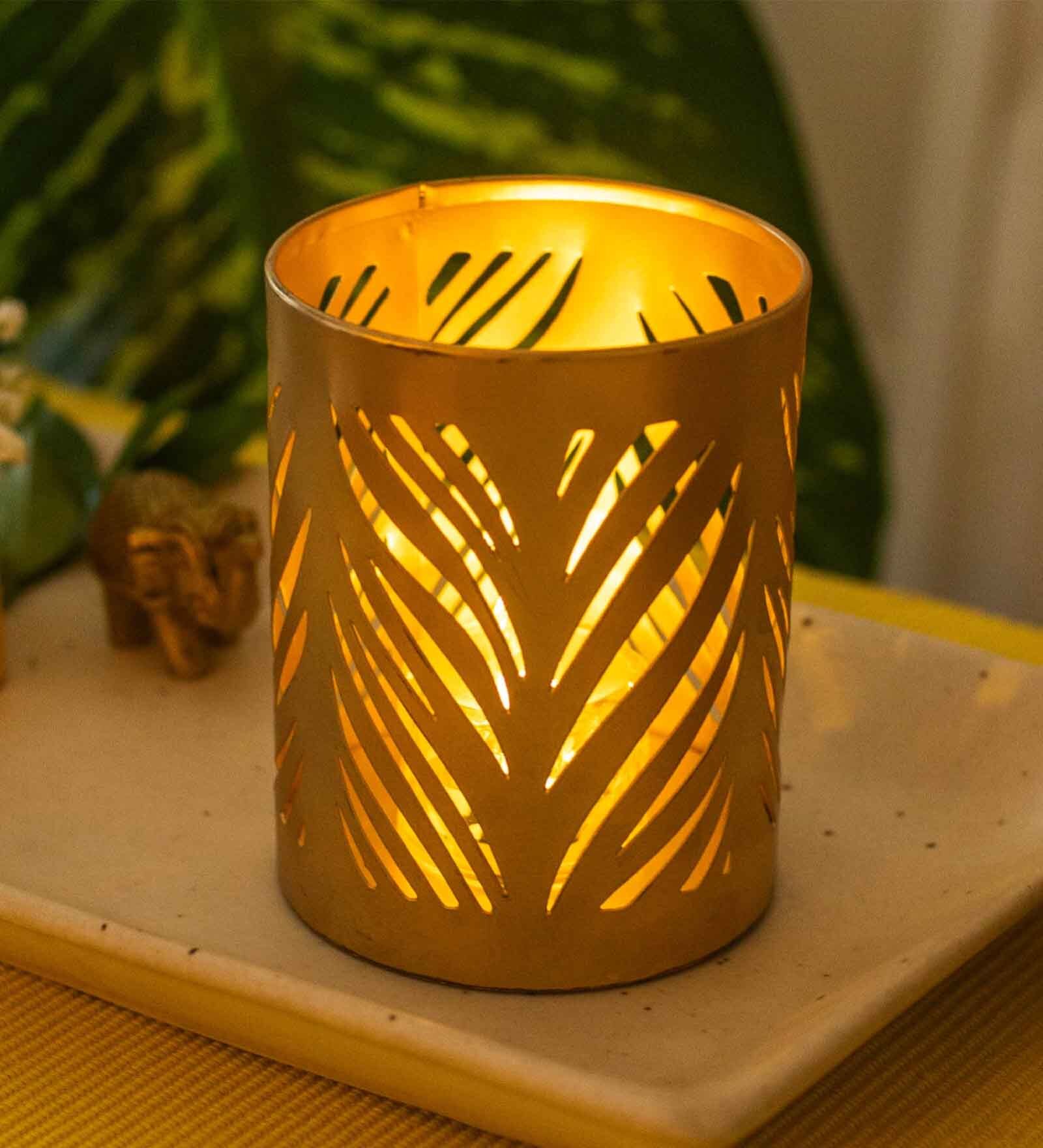 Buy Gold Iron Jaali Leaf Metal Candle Holder at 50% OFF by 10Club ...