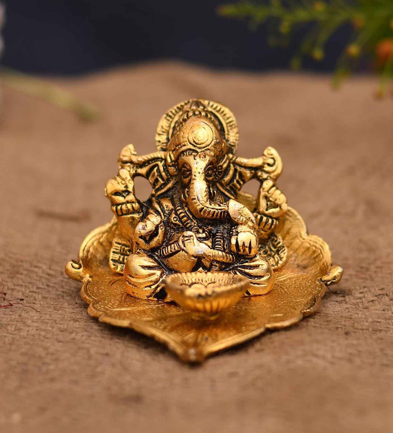 Buy Gold Metal Diya by CraftVatika at 21% OFF by CraftVatika | Pepperfry