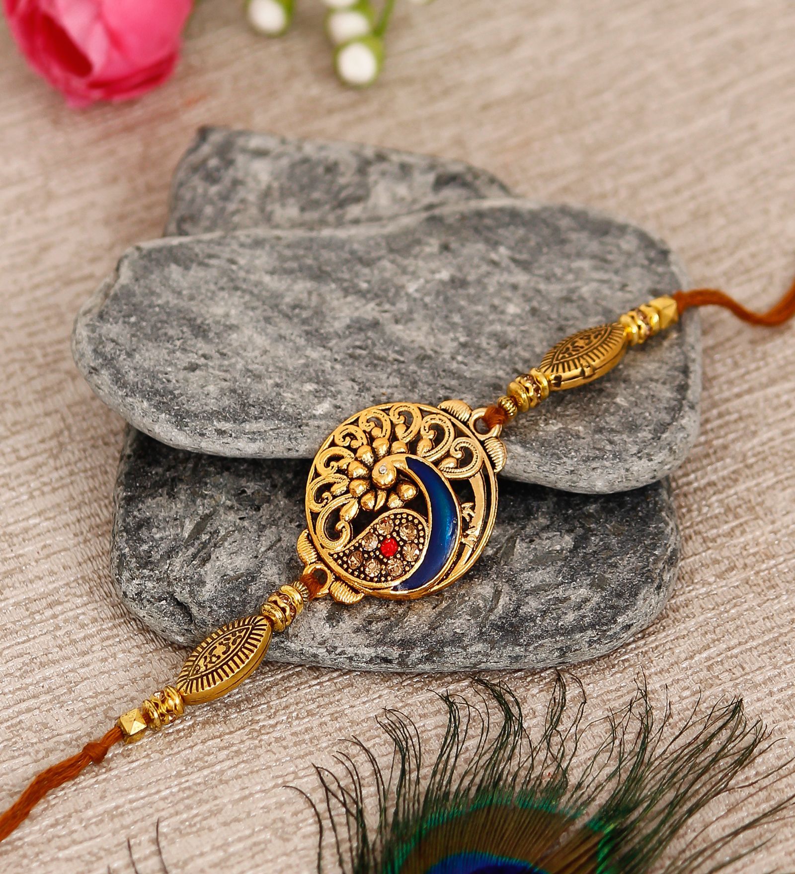 Buy Golden Designer Peacock Rakhi with Roli Chawal Pack at 34% OFF by ...
