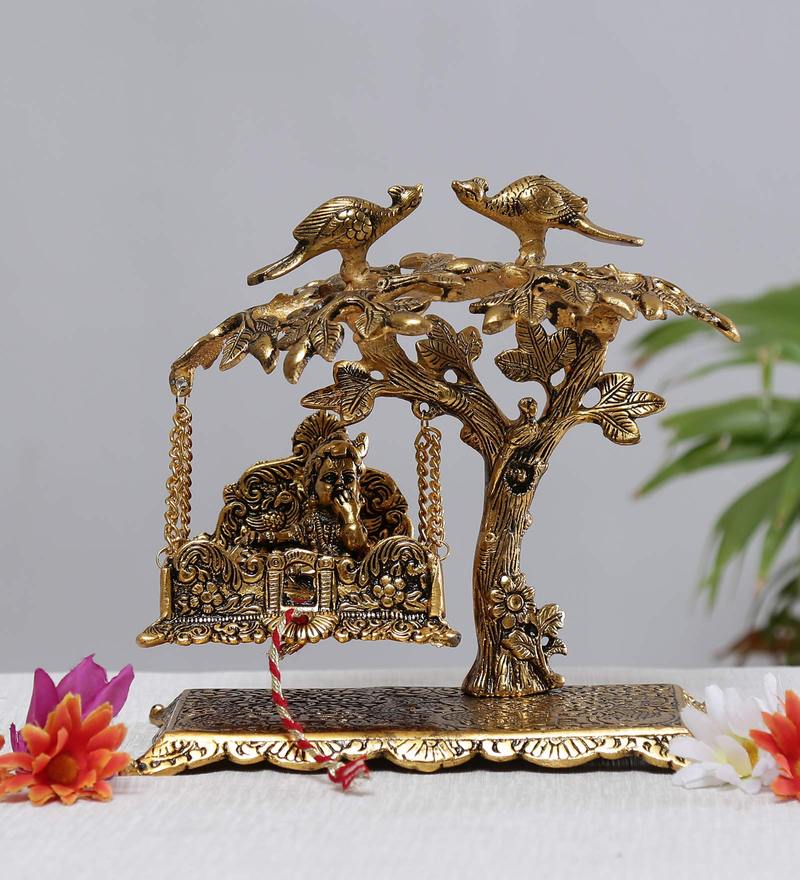 Buy Gold Aluminium Krishna Seated On A Jhoola Idol by Handicrafts ...