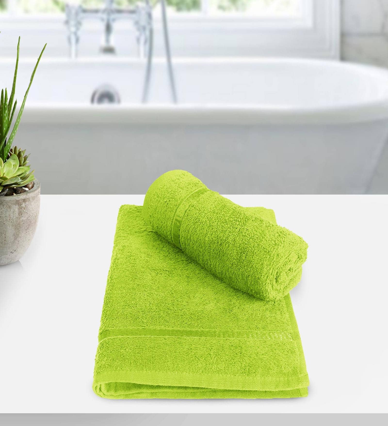 Buy Green Solid 450 GSM Cotton Towel Sets (Set of 2) by Story@Home at ...