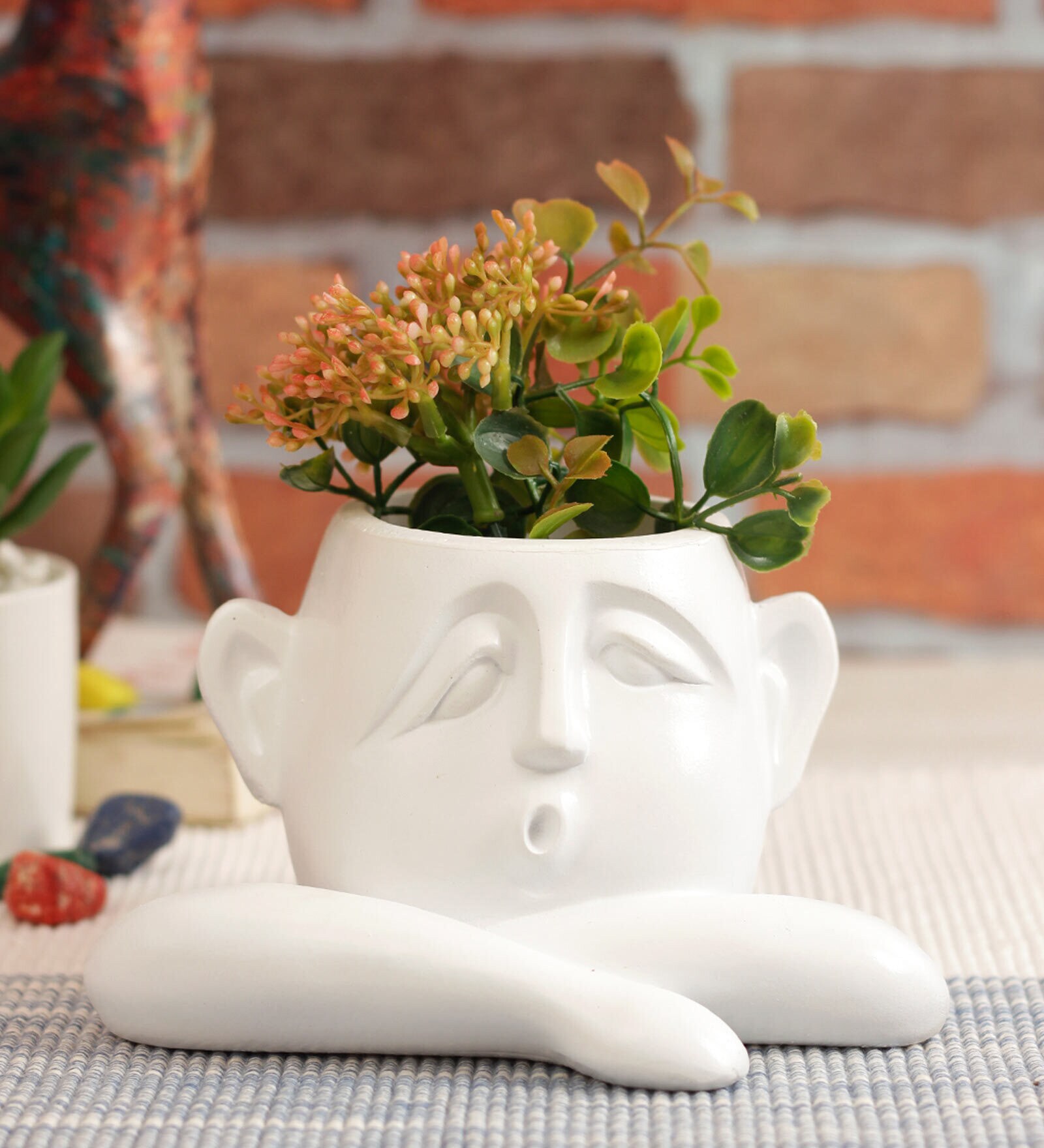 Buy Human figurine Ceramic Desk Pot at 30% OFF by Tayhaa | Pepperfry