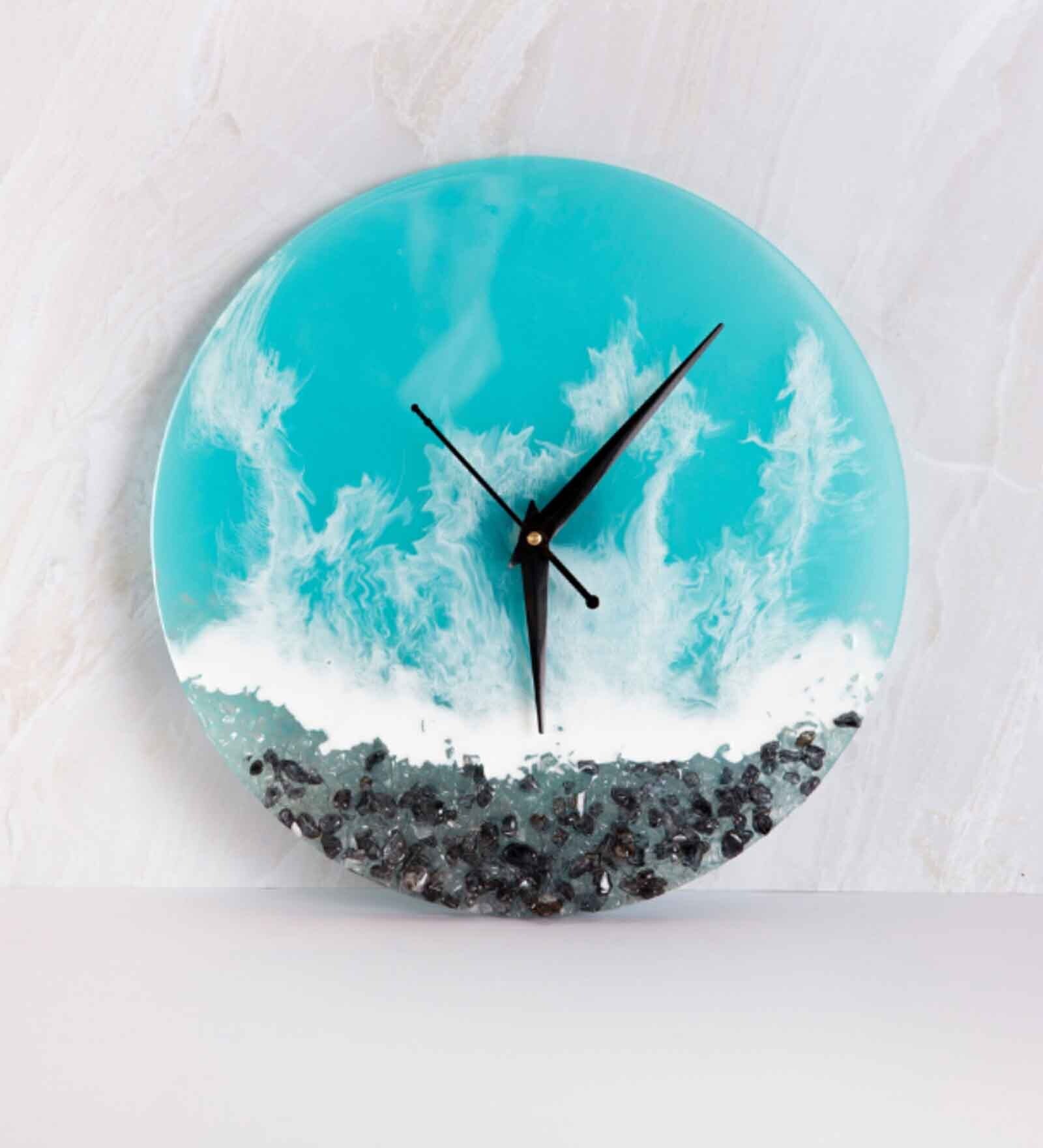 Buy Blue Resin Lagoona Modern Wall Clock at 69% OFF by HN Hues | Pepperfry