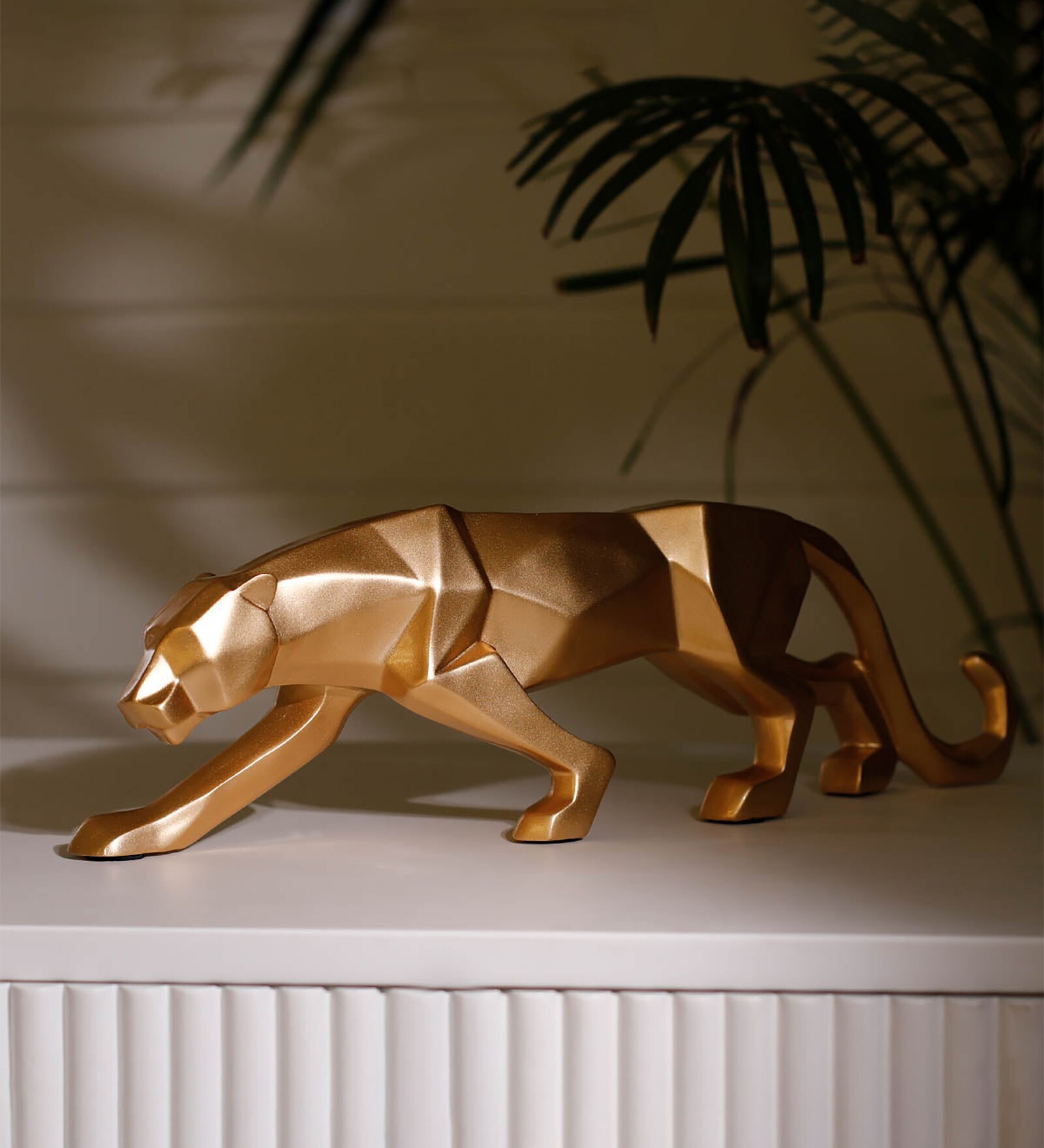 Buy Leopard Gold Resin Figurine at 20% OFF by Home4U | Pepperfry