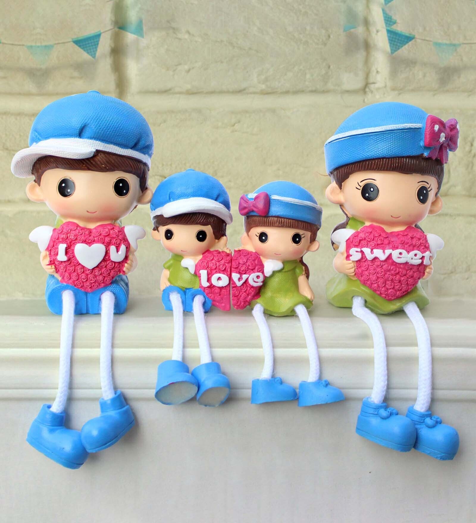 Buy Long Leg Family Couple (Set of 4) Polyresin Figurine at 26% OFF by ...