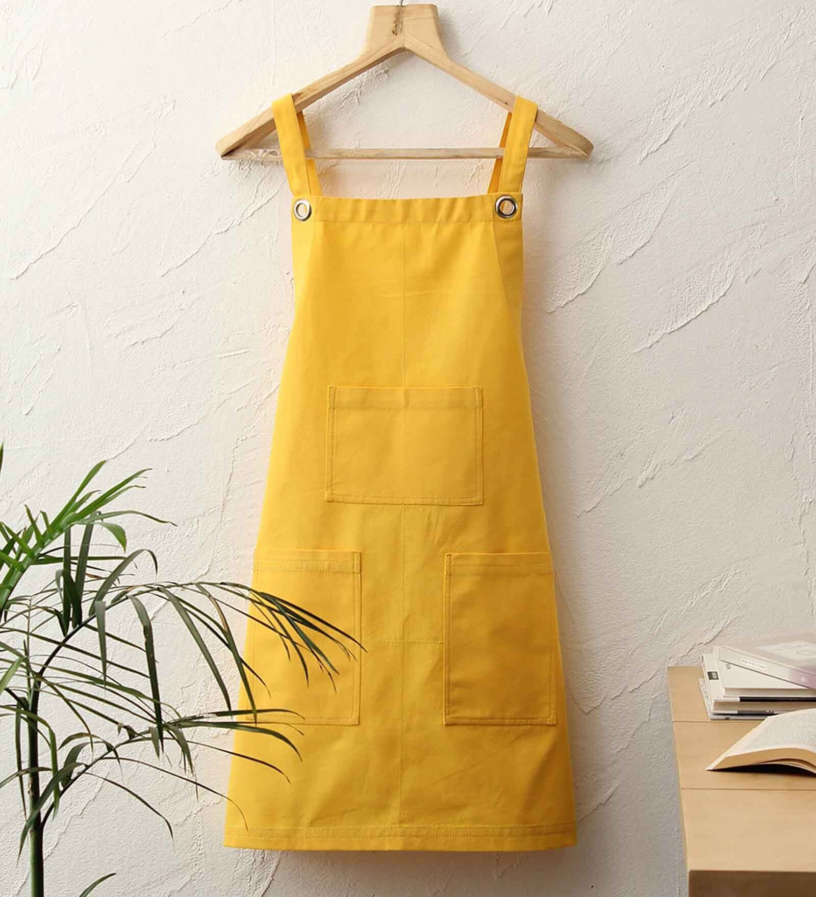 Buy Meringues Yellow Cotton Apron at 5% OFF by House This | Pepperfry