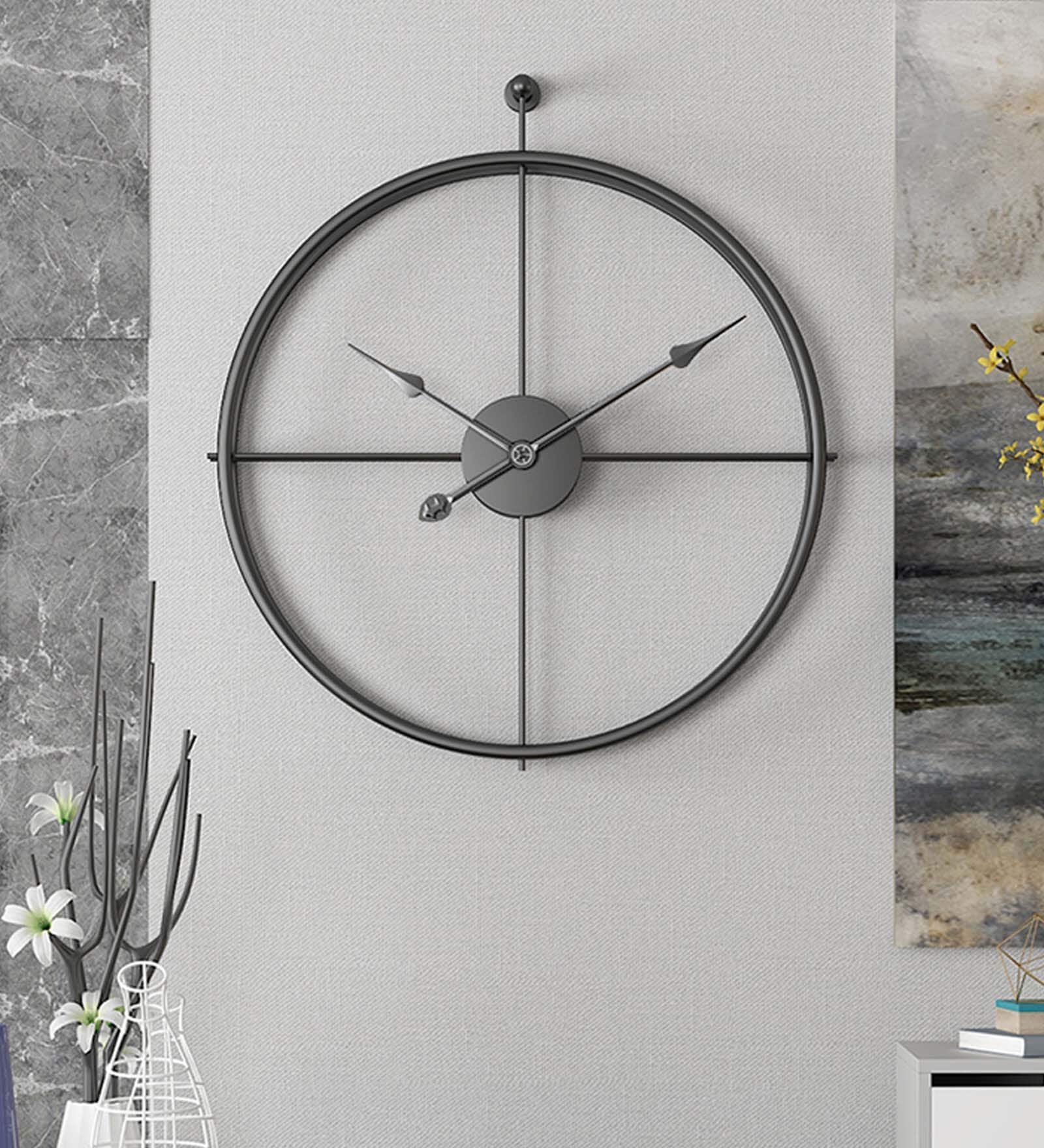 Buy Metal Elegant Minimal Wall Clock at 17% OFF by FunkyDecors | Pepperfry