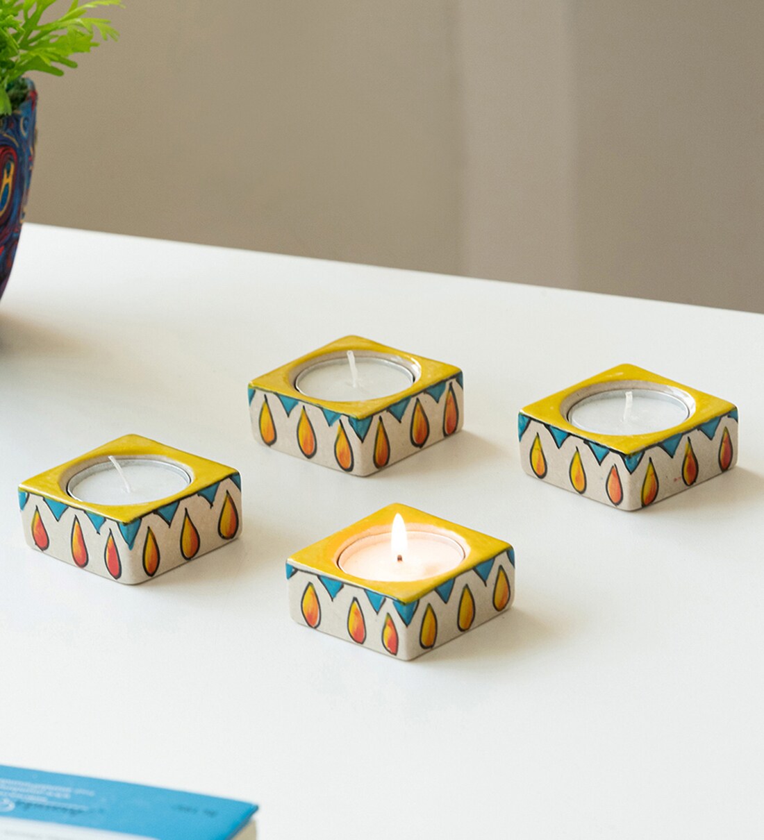 Buy Mughal Glow Yellow & White Ceramic Tea Light Holder by ExclusiveLane at 32% OFF by ...