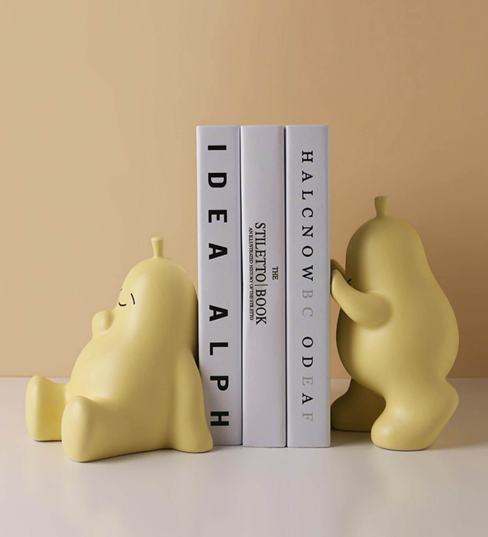 Buy Little Child Supporting Yellow Ceramic Bookend at 14% OFF by La ...