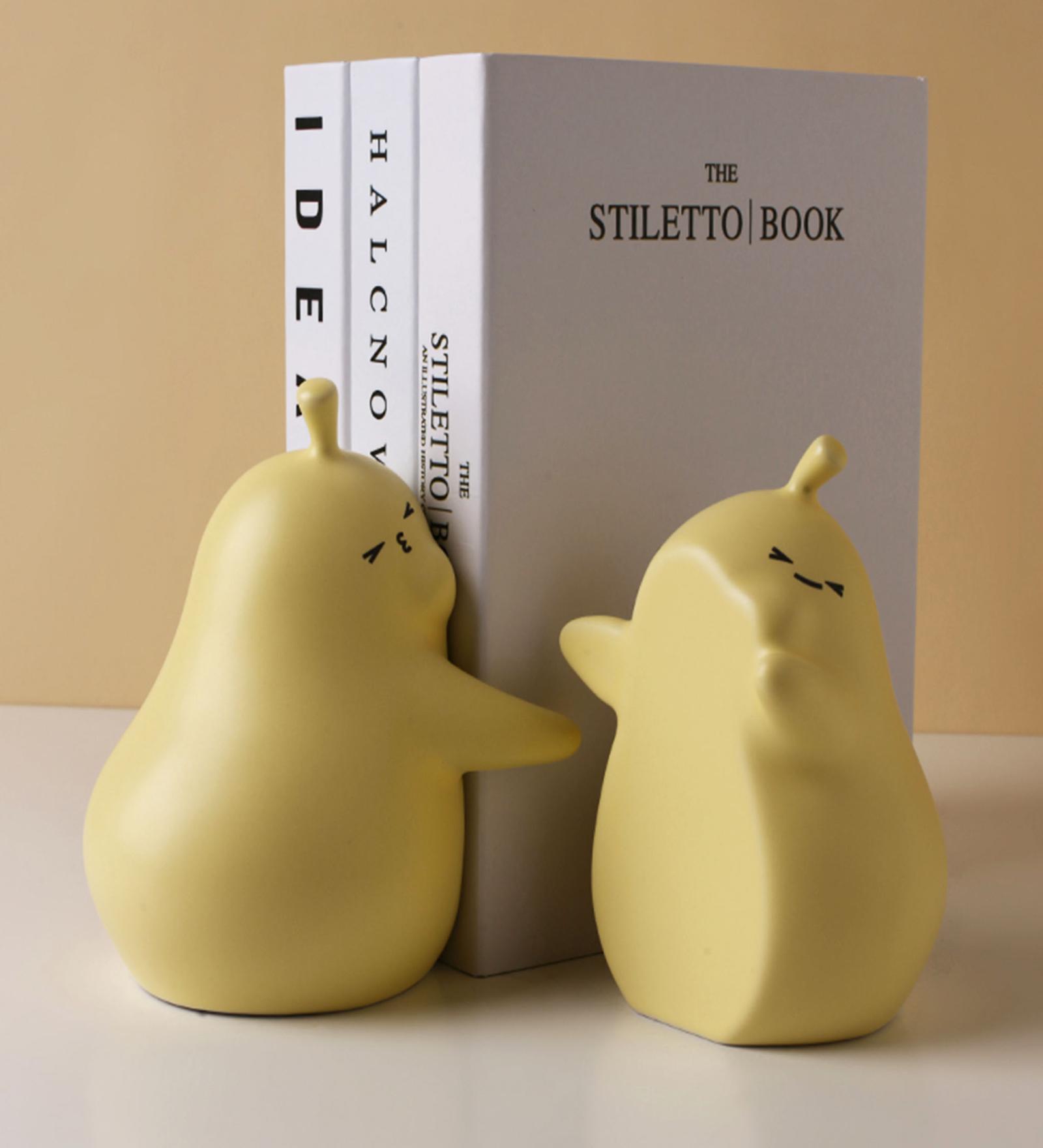 Buy Little Child Yellow Ceramic Bookend at 28% OFF by La Muse | Pepperfry