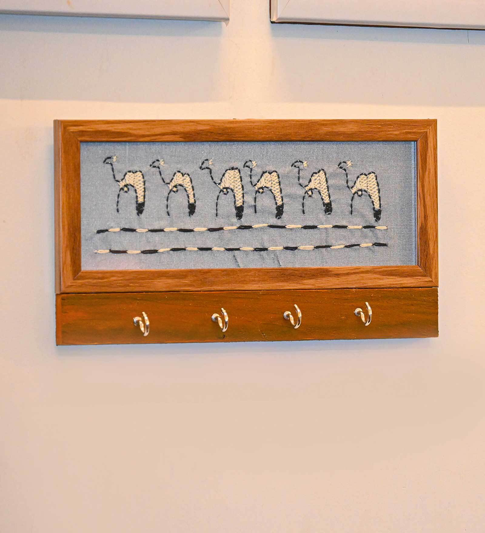 Buy New 6 Camel Emb Grey Wood Key Holder at 23% OFF by Indha | Pepperfry