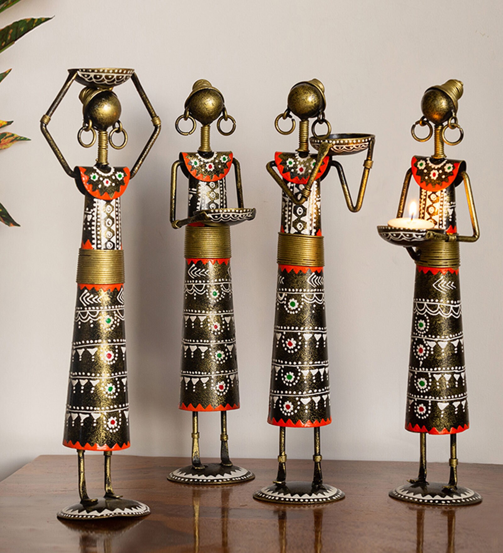 Buy Rajasthani Tribal Majdoor Ladies (Set of 4) Gold Iron Table Tea ...