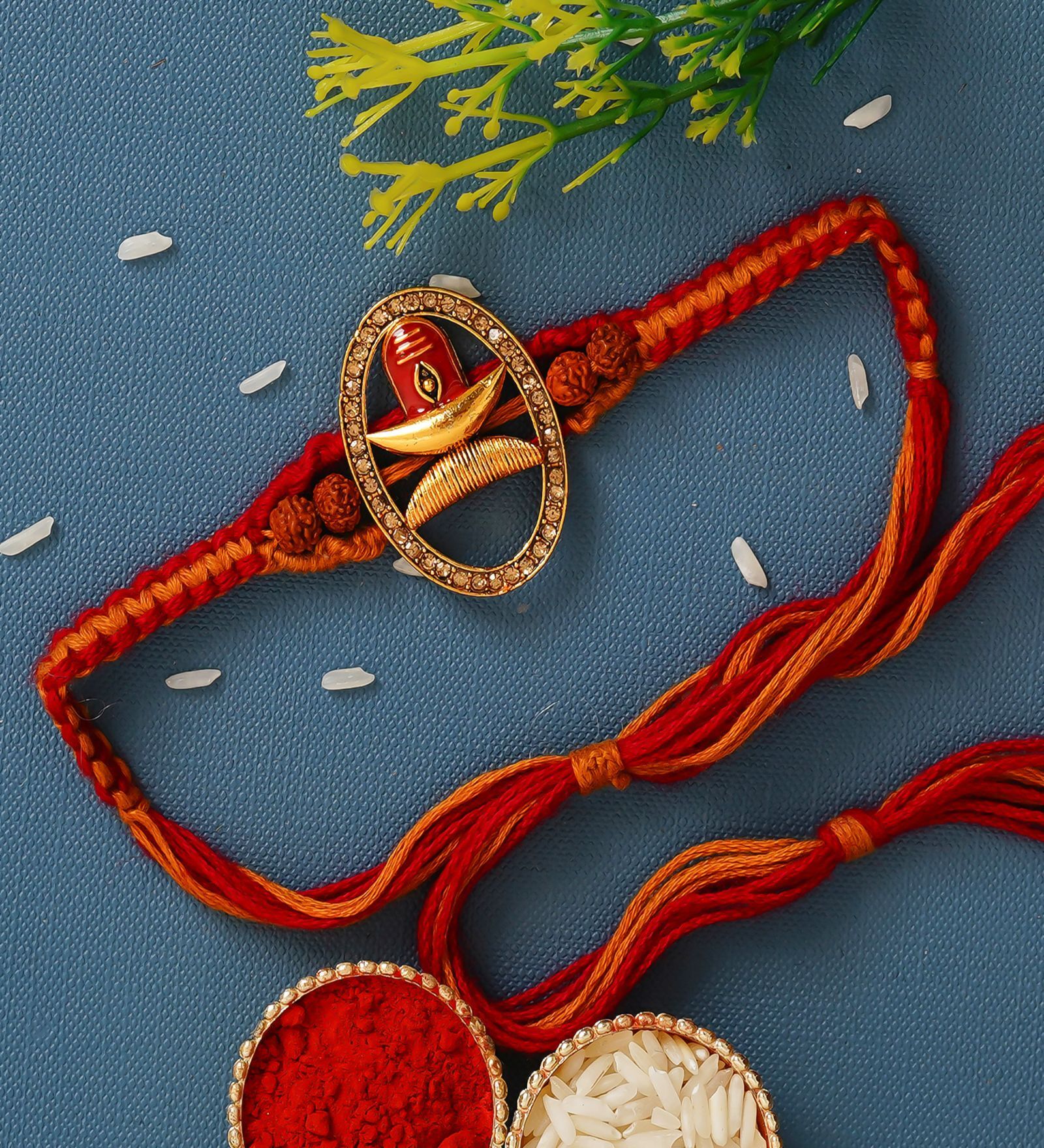 Buy Red & Orange Shivling Religious Rakhi with Roli Chawal Pack at 33% ...