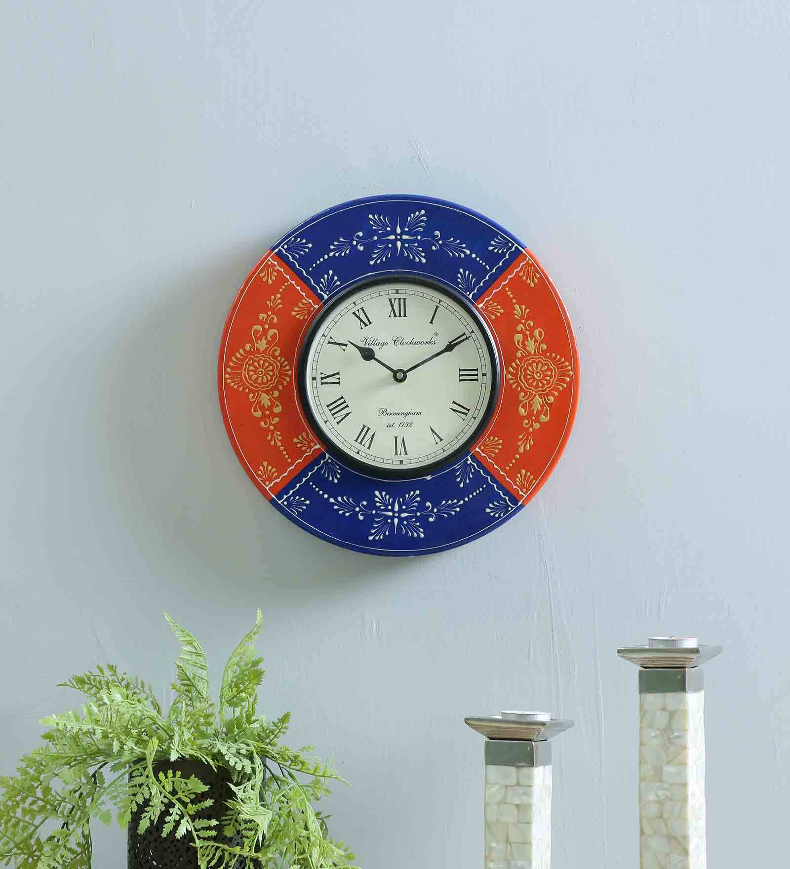 Buy Red Analog Traditional Wall Clock at 31% OFF by Ujjwal Wood | Pepperfry