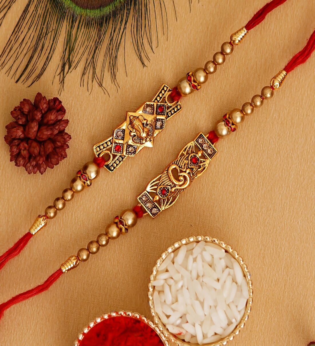 Buy Set of 2 Lord Ganesha and Om Religious Rakhis with Roli Chawal Pack ...