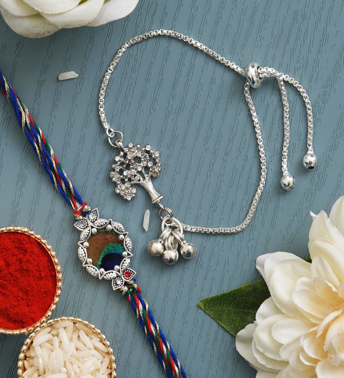 Buy Set of 2 Silver & Colorful Peacock Feather Rakhi and Tree Design ...