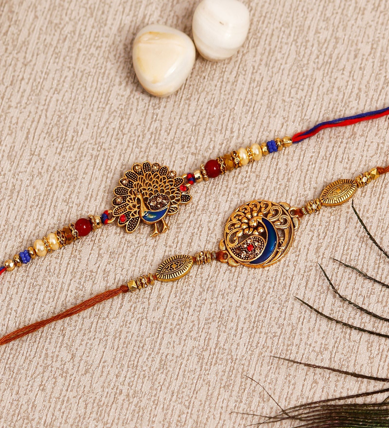 Buy Set of 2 Designer Peacock Rakhis with Roli Chawal Pack at 33% OFF ...