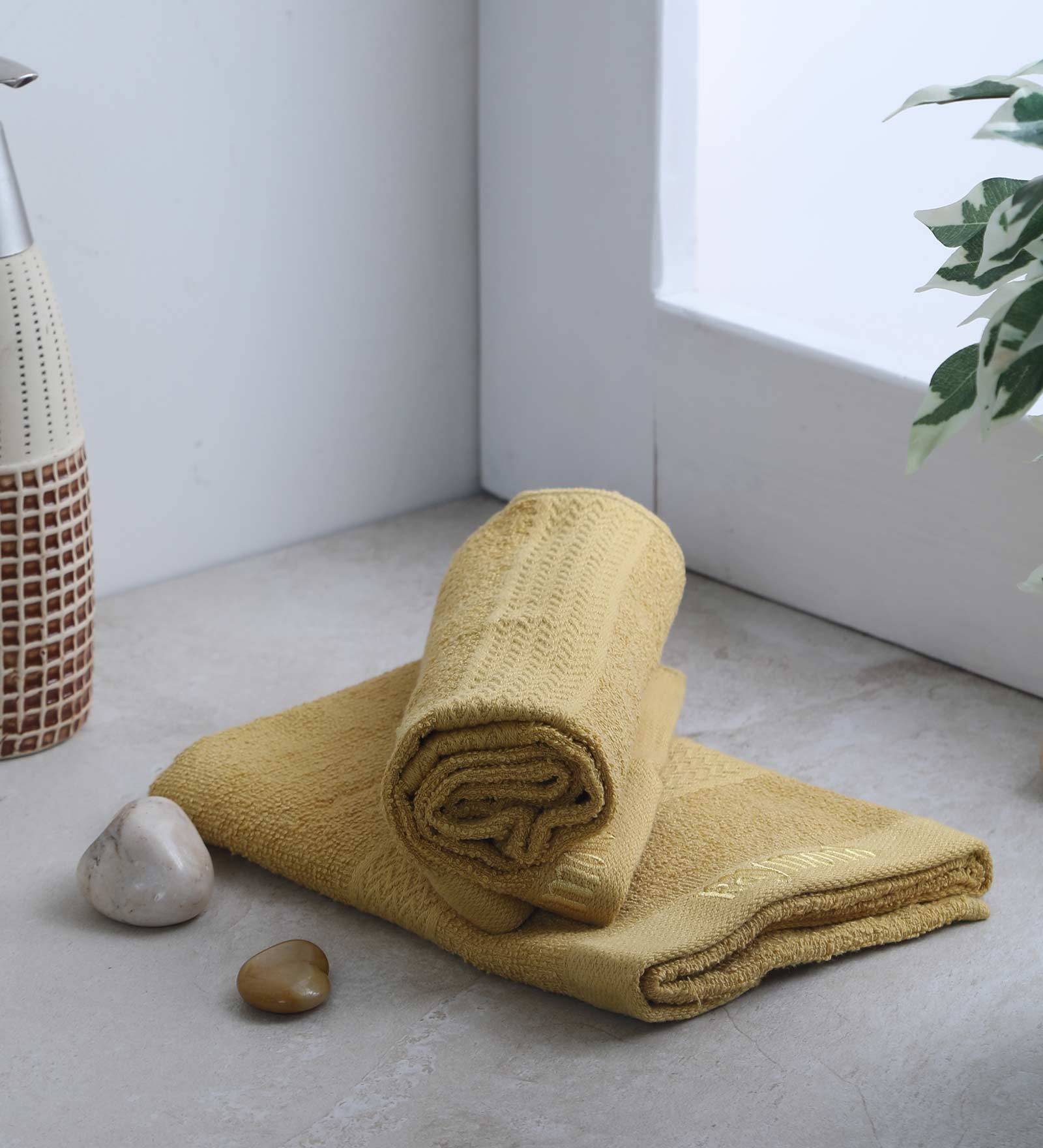 Buy Yellow Solid 380 GSM Cotton Hand Towels (Set of 4) by Raymond Home ...