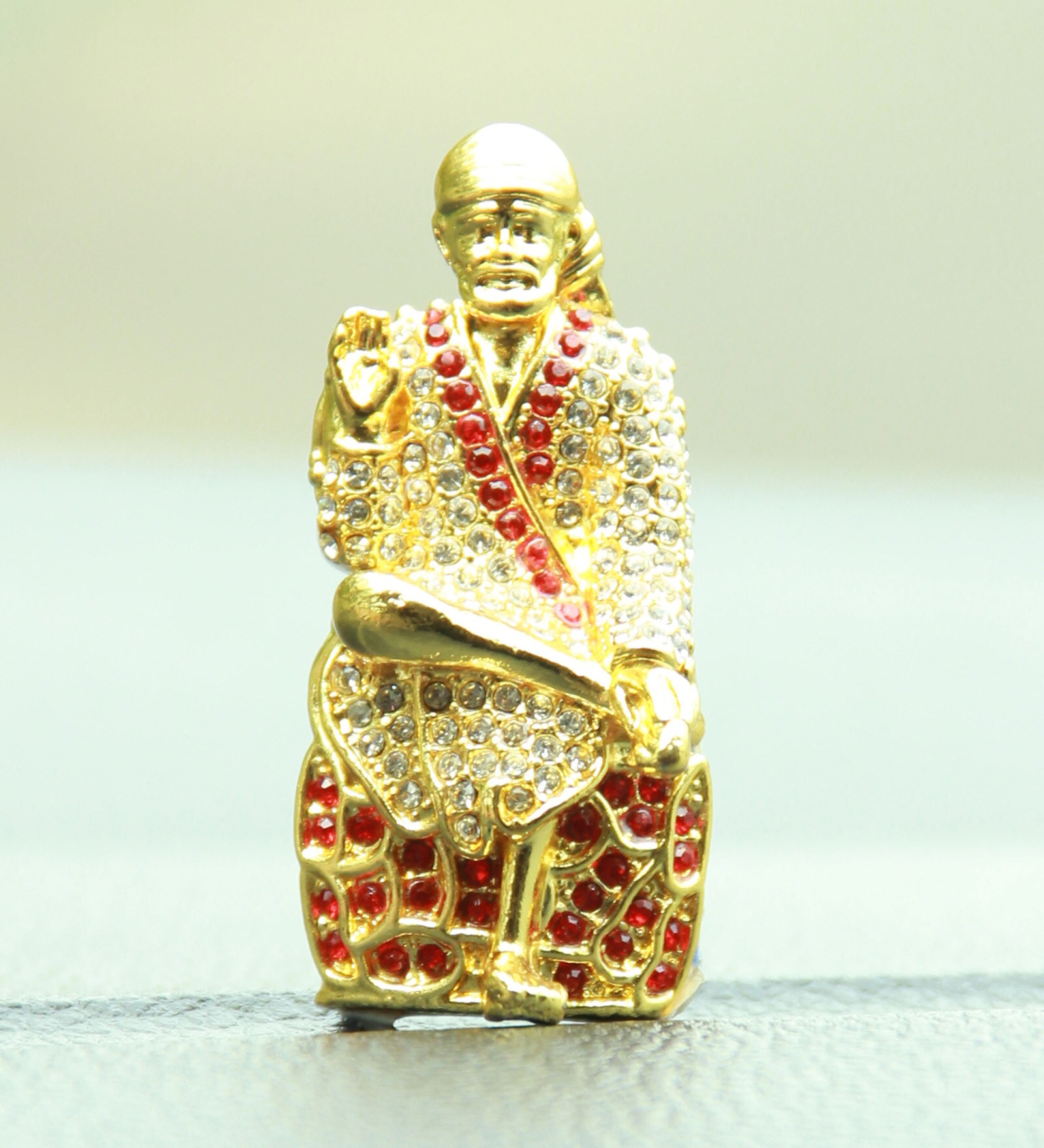 Buy The Nodding Head Golden and Red Gold Plated Sitting Sai Baba for Car Dashboard Online ...