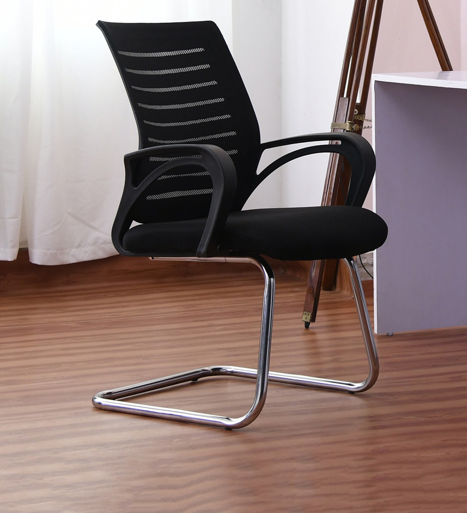Buy Tulip Cantilever Chair in Black Colour at 47% OFF by Da Urban ...