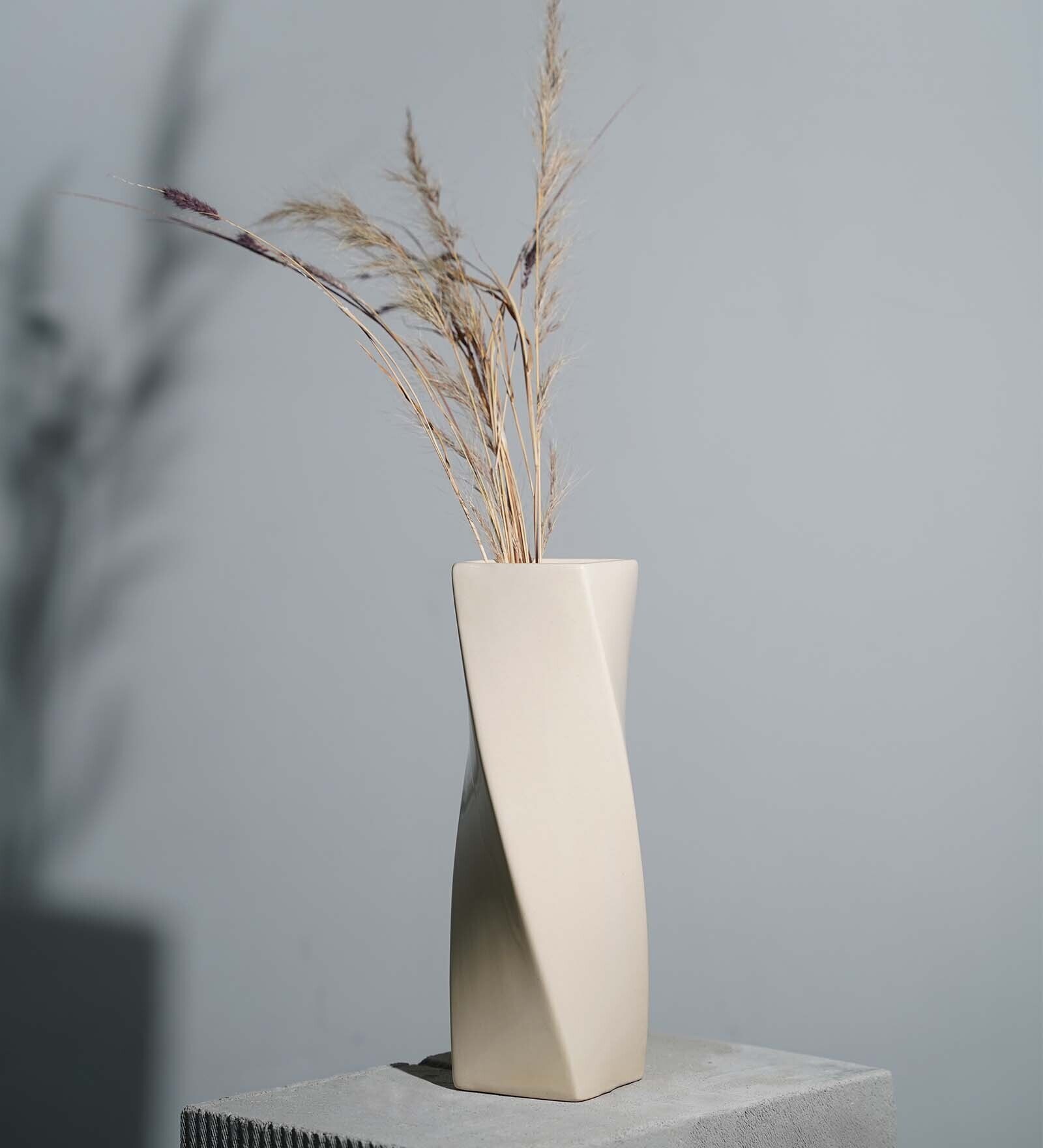 Buy Twisted Ceramic Table Vase at 29% OFF by Folkstorys | Pepperfry