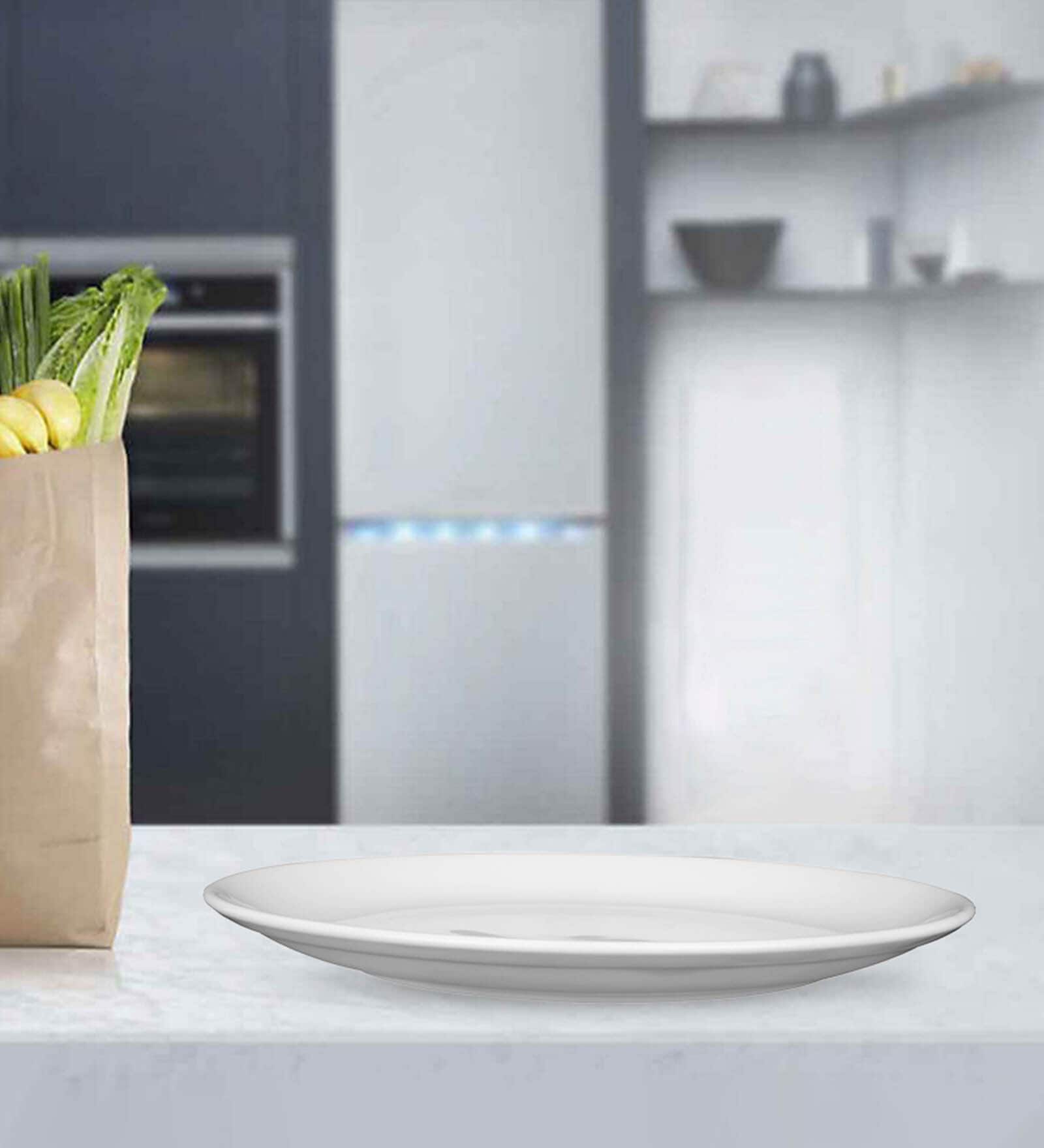 Buy Urmi 7 Inch White Ceramic Quarter Plate at 10% OFF by @home | Pepperfry