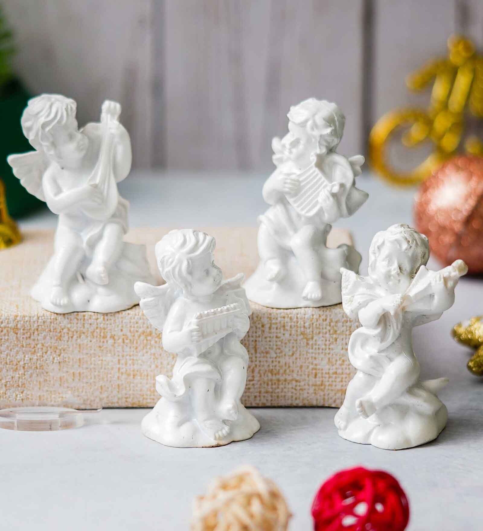 Buy White Resin Little Angel Statues (Set of 4) at 33% OFF by ...